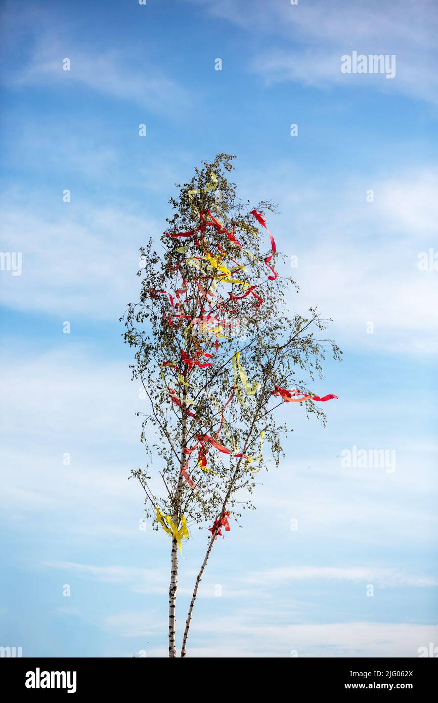 Decorated Maypole In Front Of Blue Sky. May Day Customs And Tradition ...