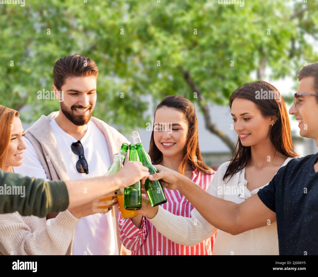 Group friends toasting clinking hi-res stock photography and images - Alamy