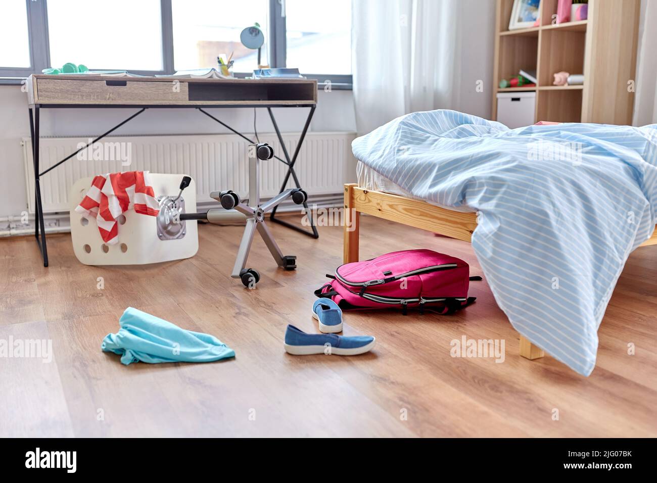 messy home or kid's room with scattered stuff Stock Photo - Alamy
