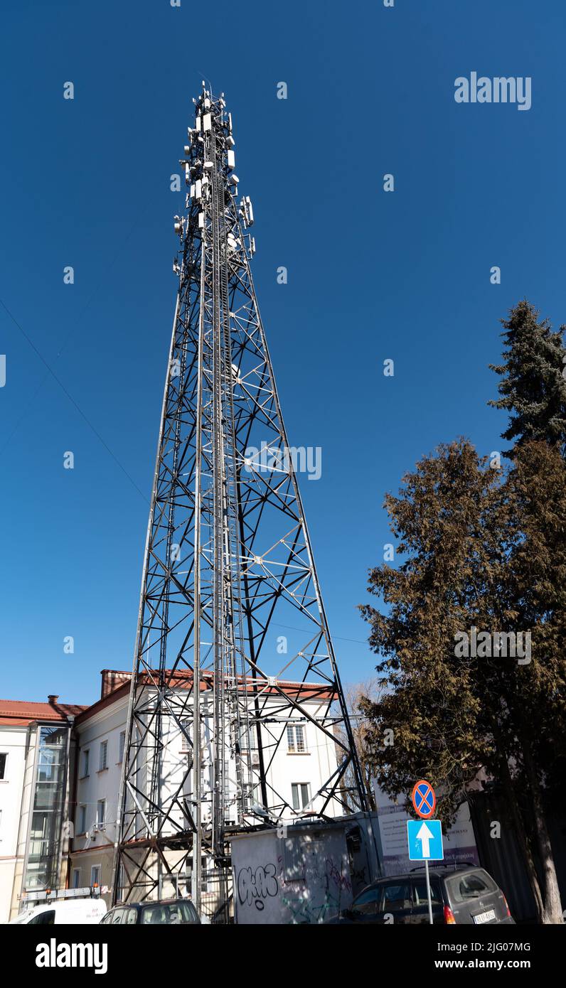 Cell phone relay tower. Metal mast. Metal structure with mounted relays ...