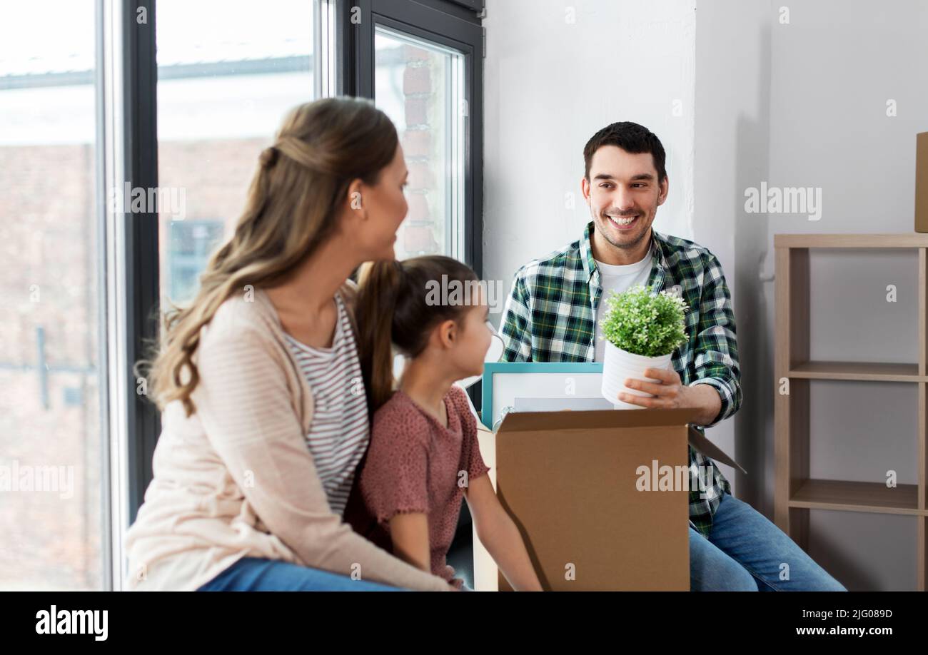 happy family with child moving to new home Stock Photo - Alamy