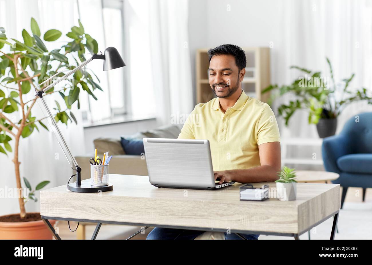 indian man with laptop working at home office Stock Photo - Alamy