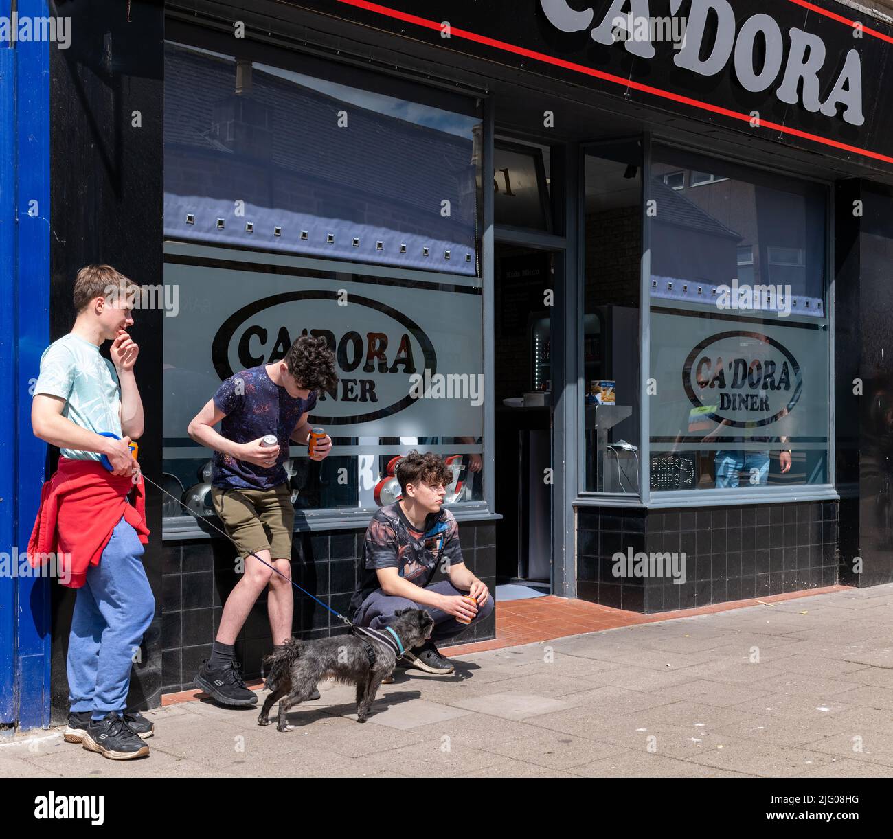 1 July 2022. High Street, Elgin, Moray, Scotland. This is 3 boys ...