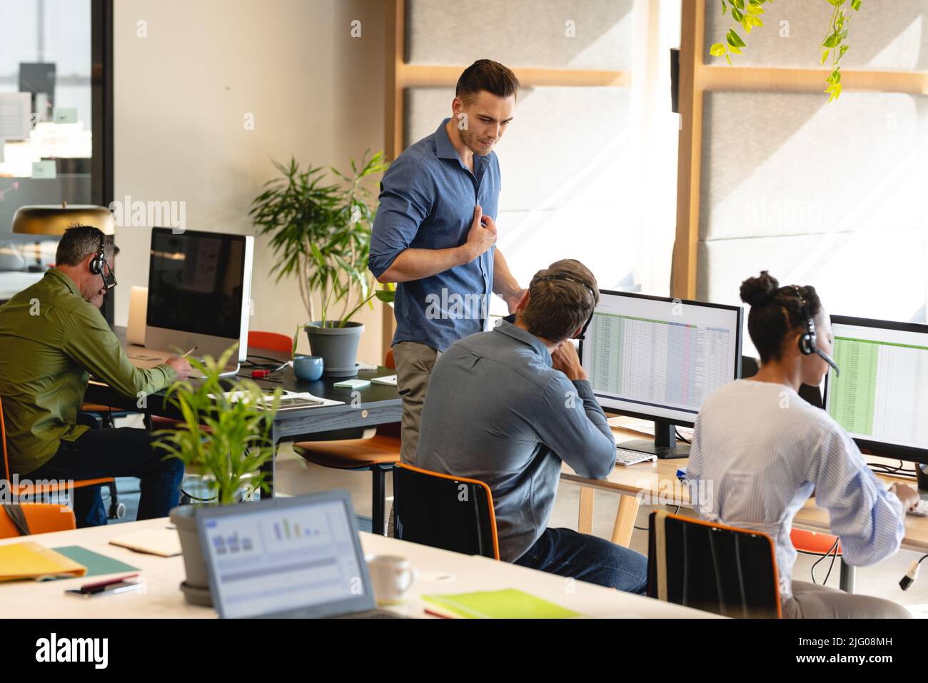 Male worker explaining hi-res stock photography and images - Alamy
