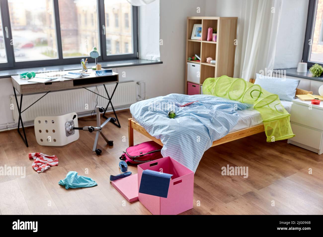 messy home or kid's room with scattered stuff Stock Photo - Alamy