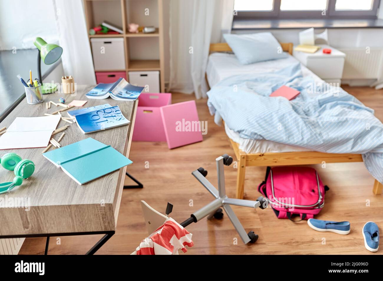 messy home or kid's room with scattered stuff Stock Photo - Alamy