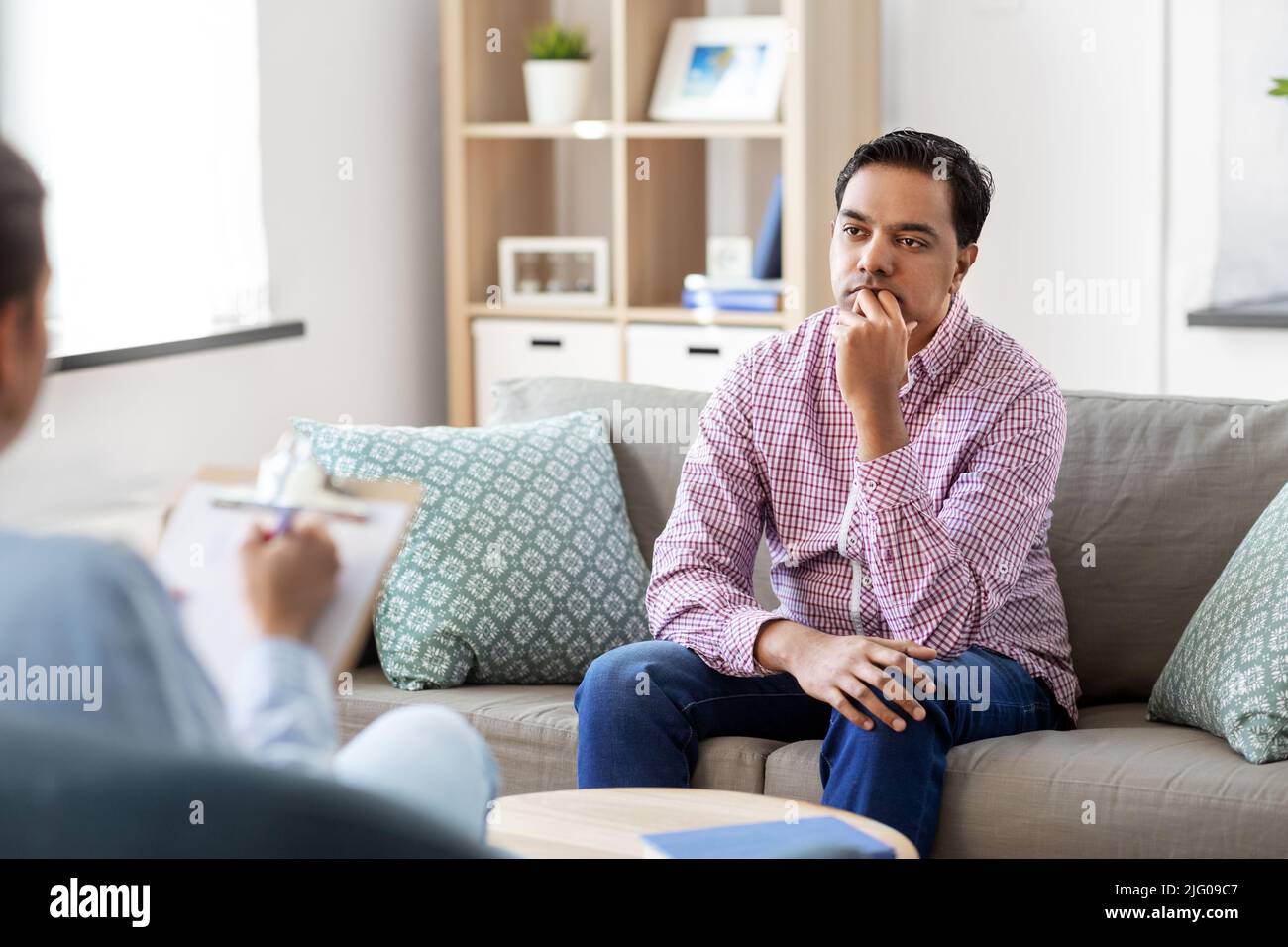 man and psychologist at psychotherapy session Stock Photo - Alamy