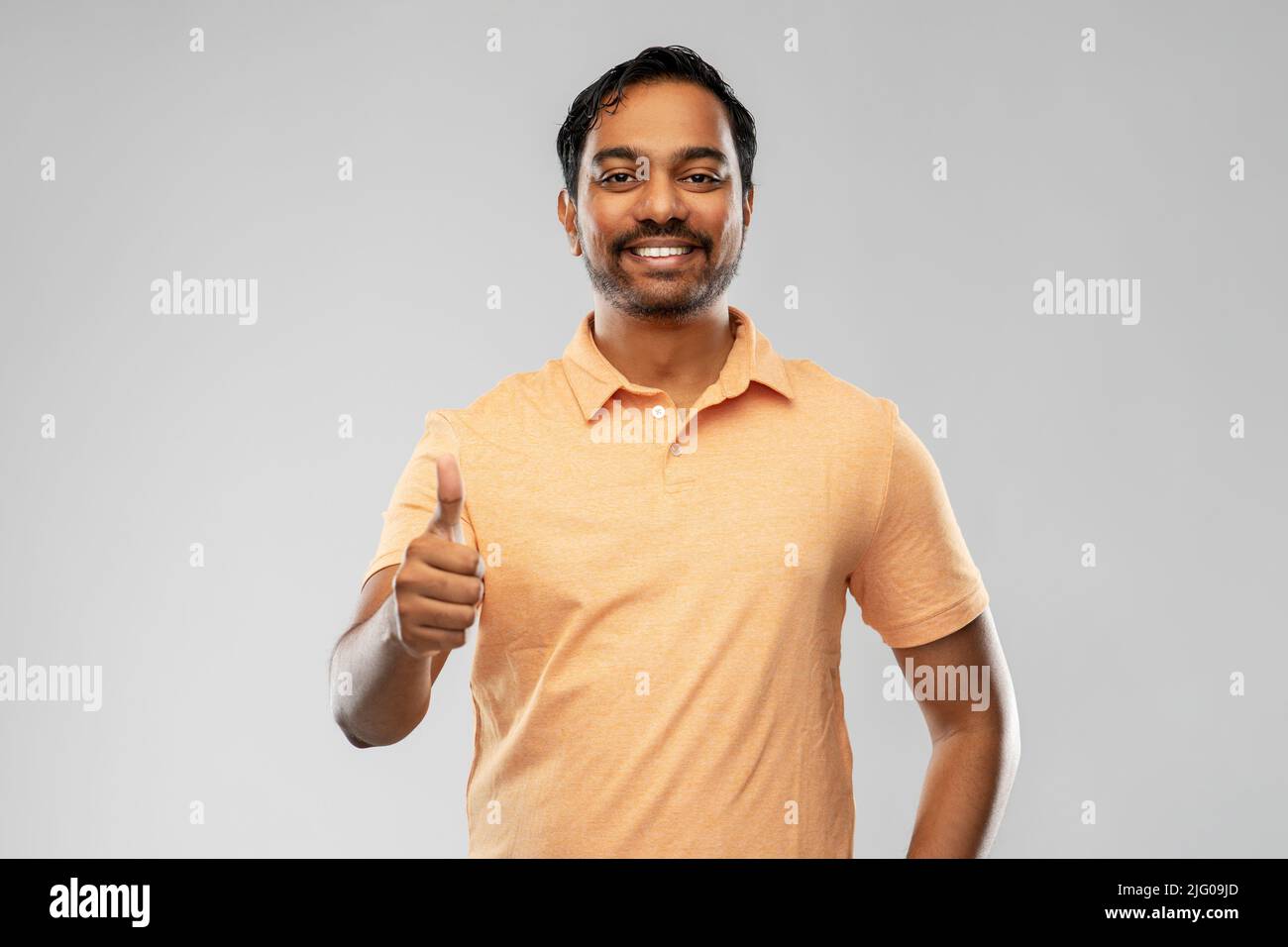 portrait of happy indian man showing thumbs up Stock Photo - Alamy