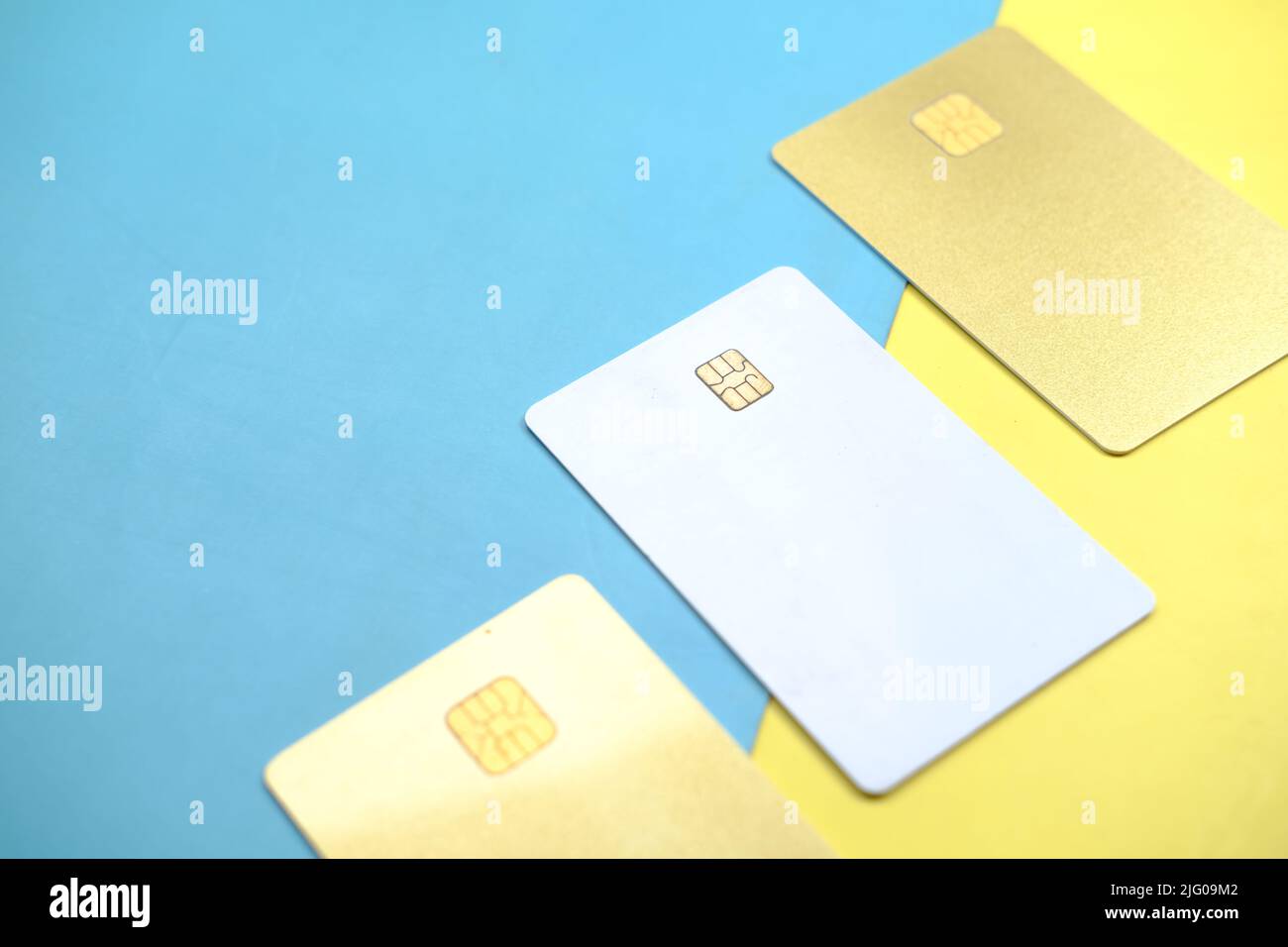 close up of credit cards on color background Stock Photo - Alamy