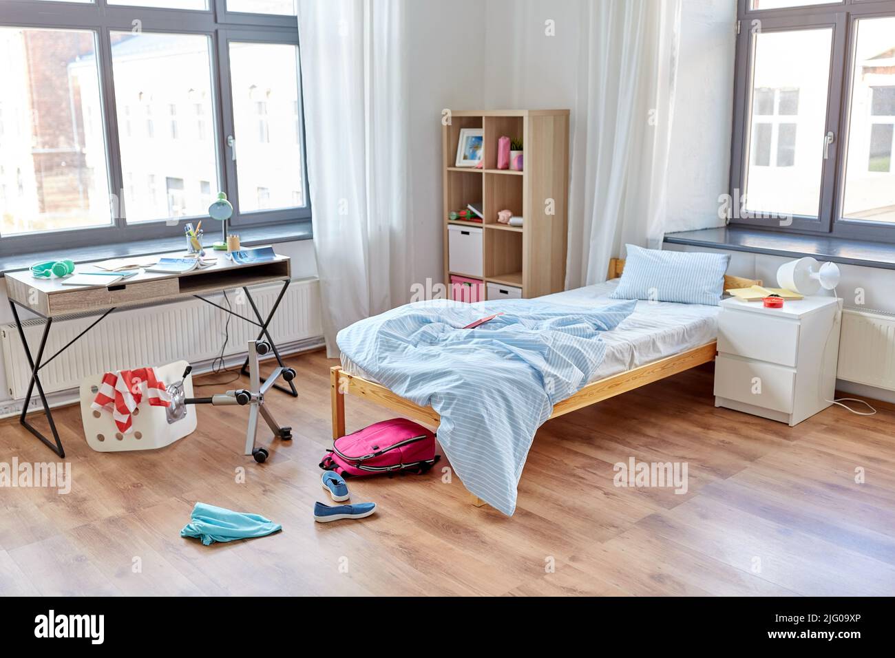 messy home or kid's room with scattered stuff Stock Photo - Alamy