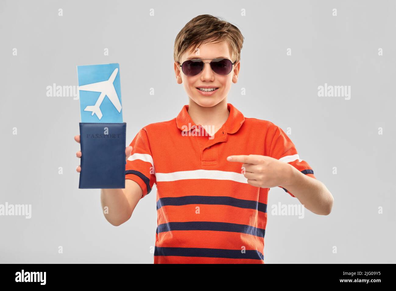 Boy with travel ticket hi-res stock photography and images - Alamy
