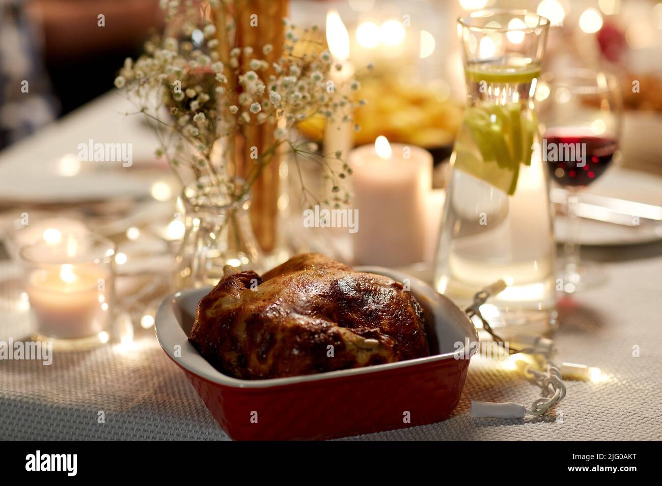 roast chicken on served table at home dinner party Stock Photo - Alamy