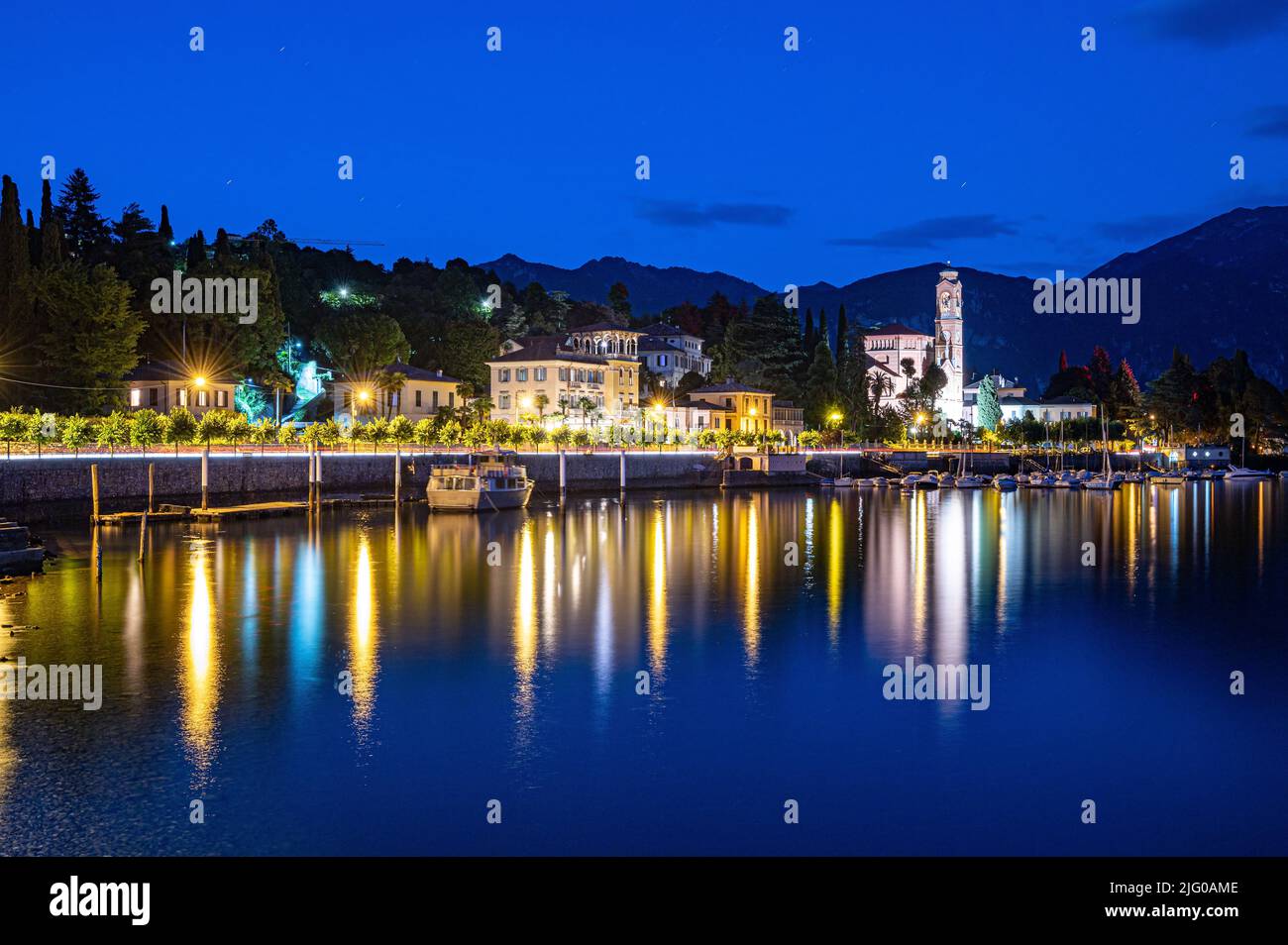 The town of Tremezzina, on Lake Como, photographed in the evening Stock ...