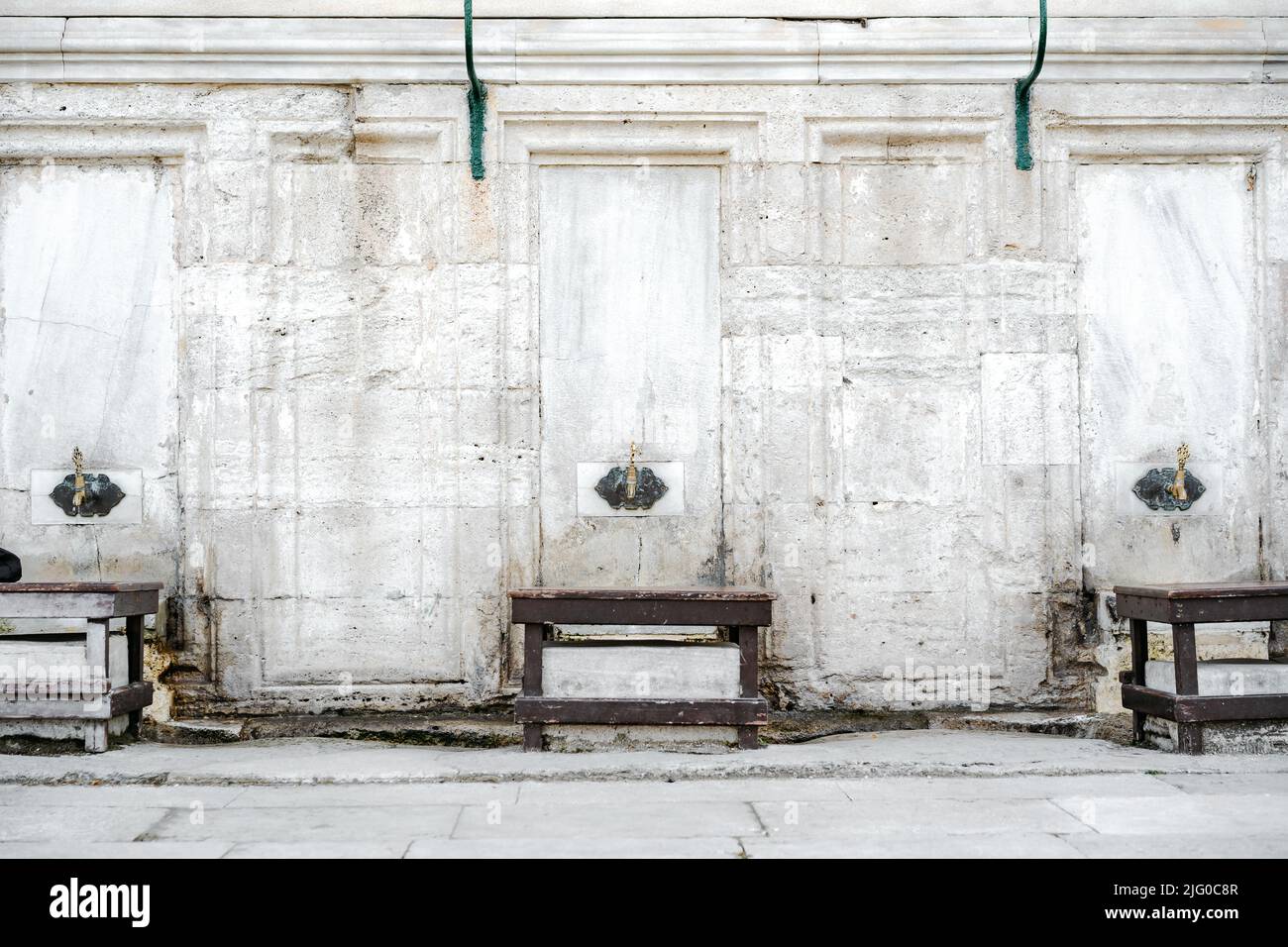 Water tap for washing hands and feet before the prayer in ablution ...