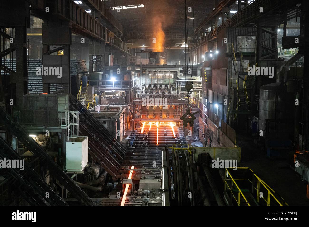 Riesa, Germany. 06th July, 2022. Steel billets are formed in a ...