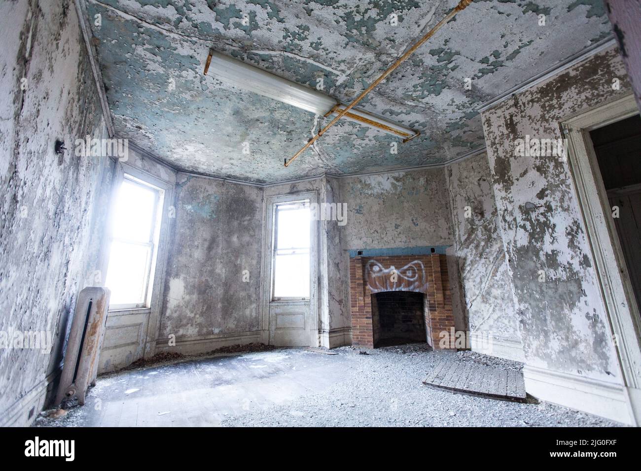 An abandoned and ruined interior of a building Stock Photo - Alamy