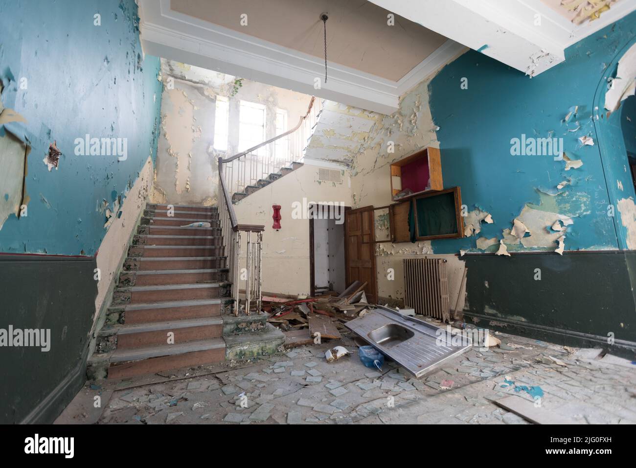 An abandoned and ruined interior of a building Stock Photo - Alamy