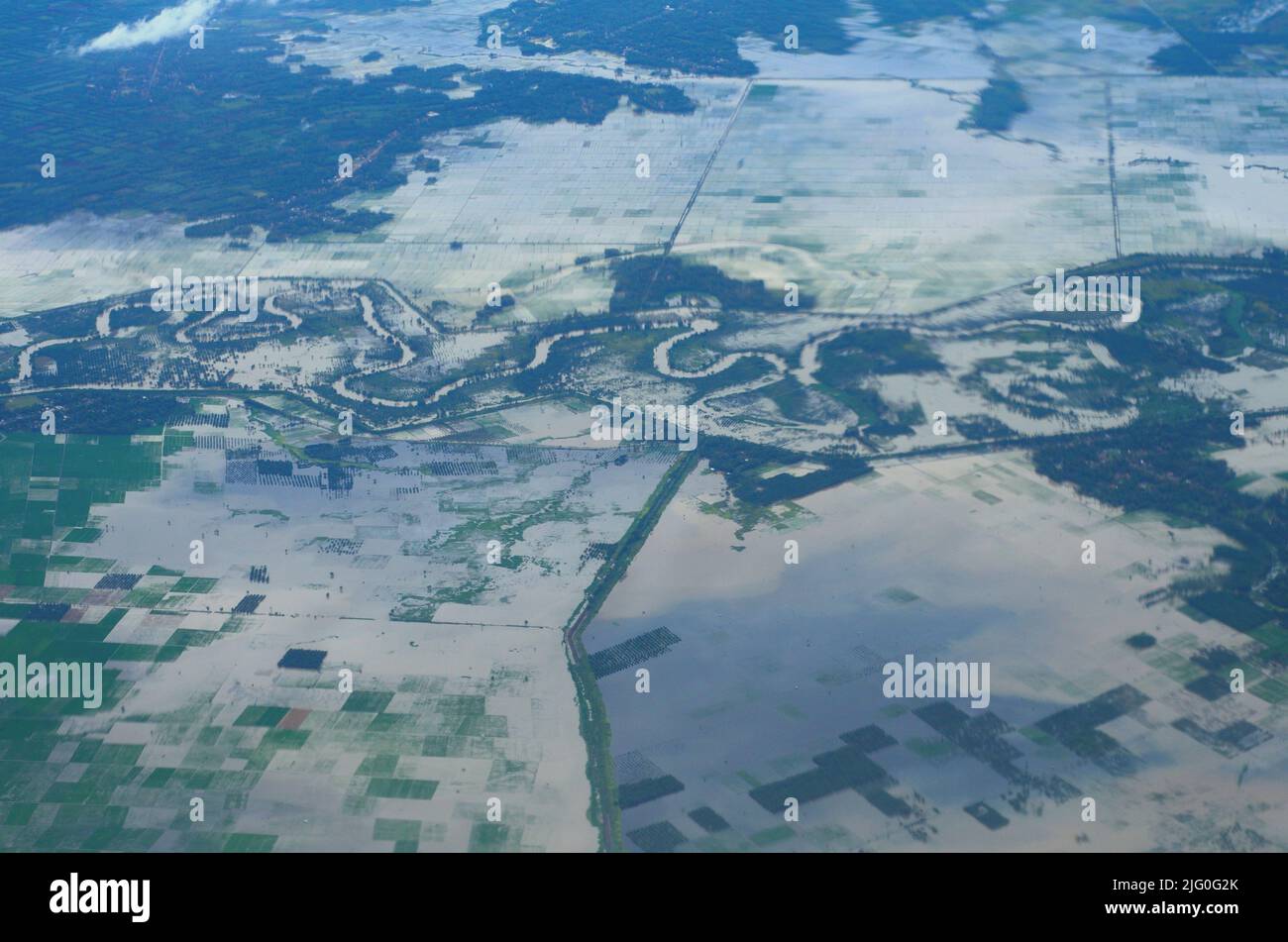 An aerial view of a landscape with fields covered in snow Stock Photo ...