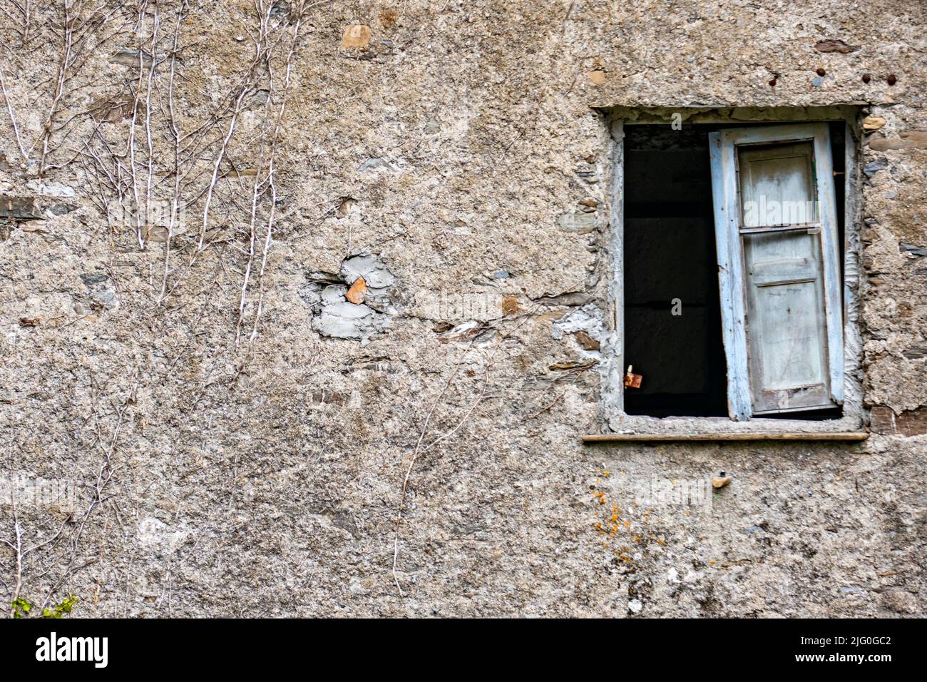 A broken and wooden window on the wall Stock Photo - Alamy