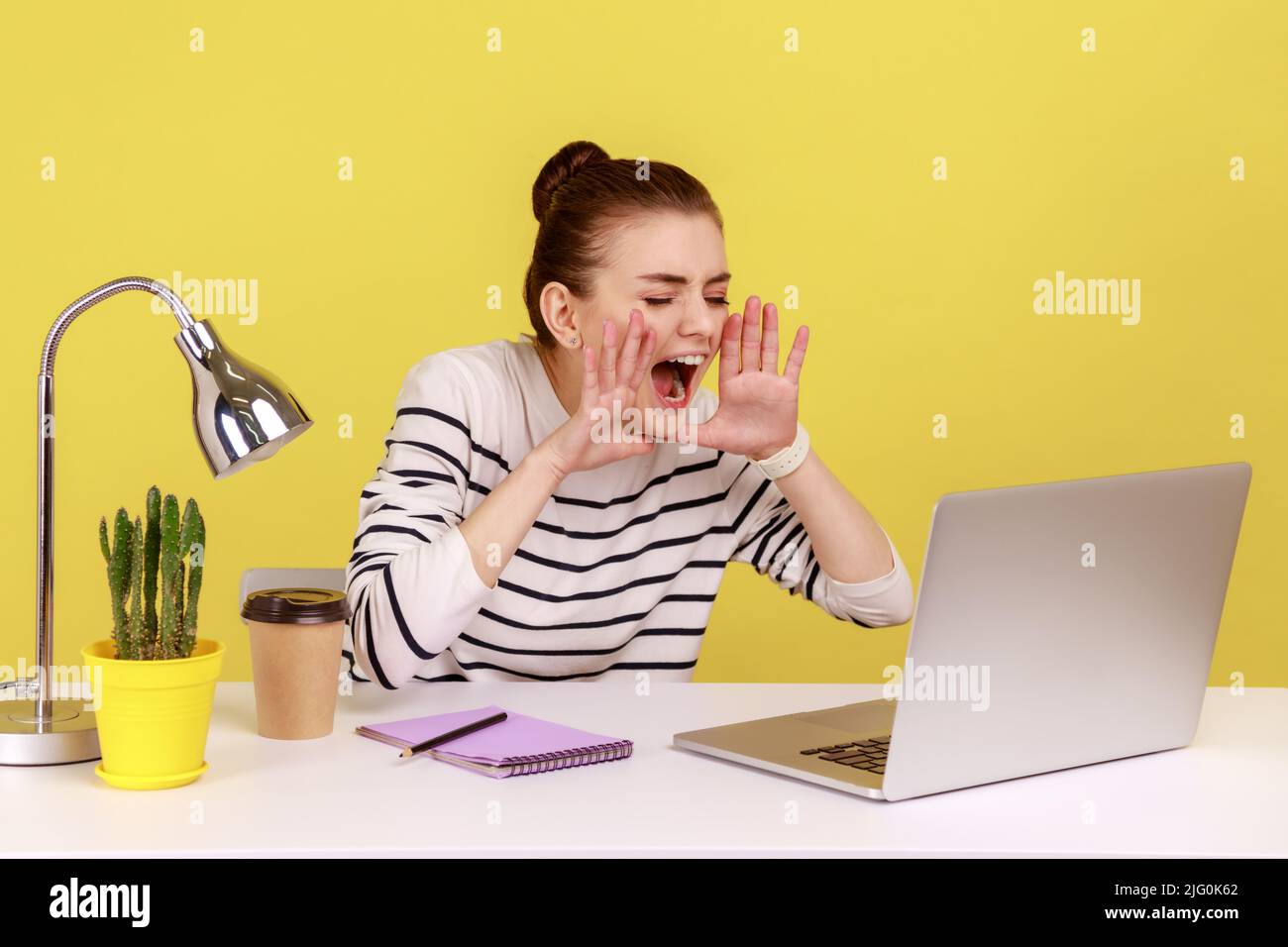 Nervous angry woman office worker in striped shirt loudly screaming ...