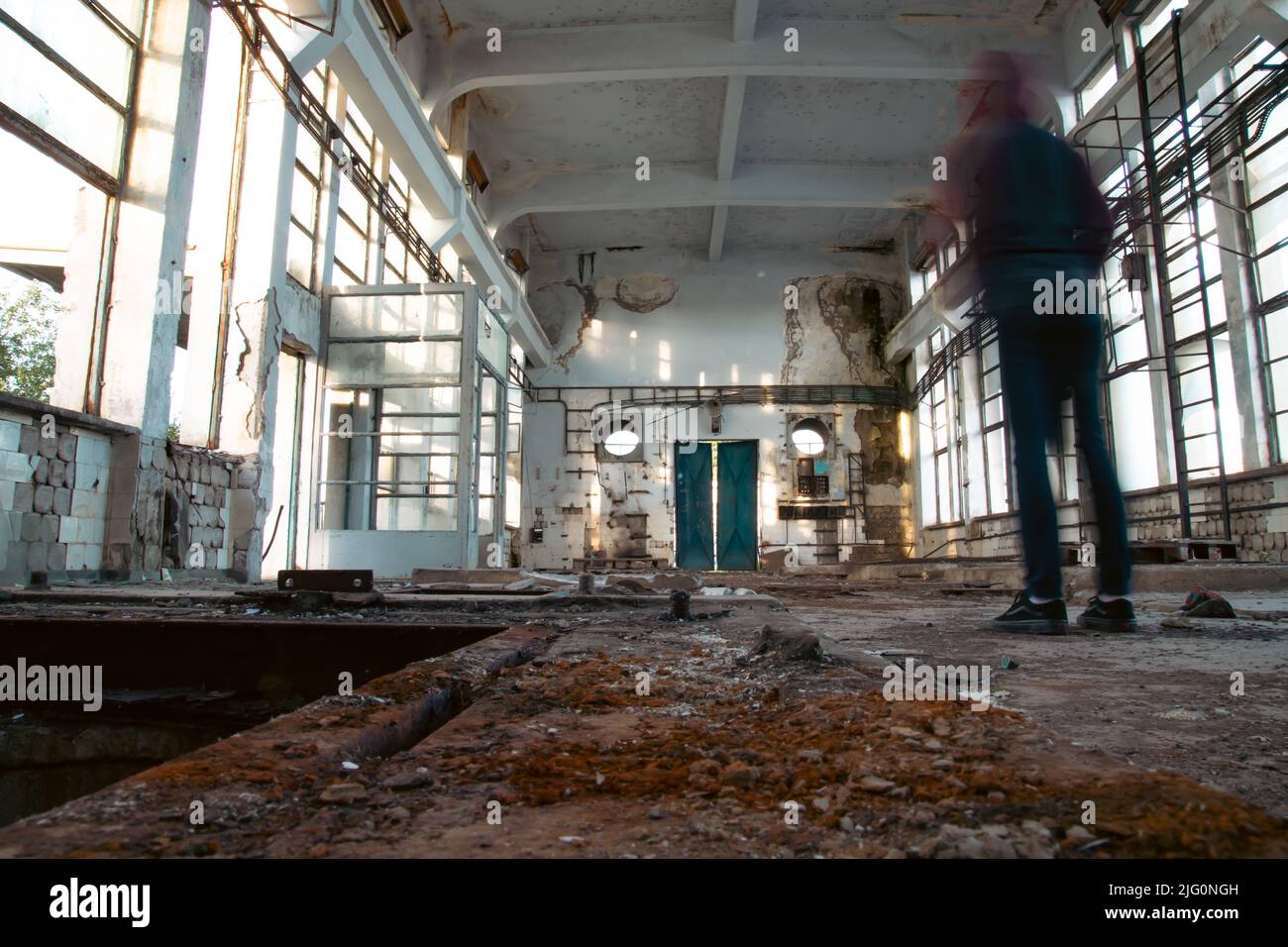 Person standing with hope on ruins of destroyed during war fighting ...