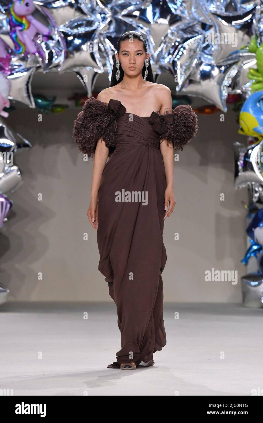 Model Jiayun Xie walks on the runway at the Giambattista Valli fashion ...