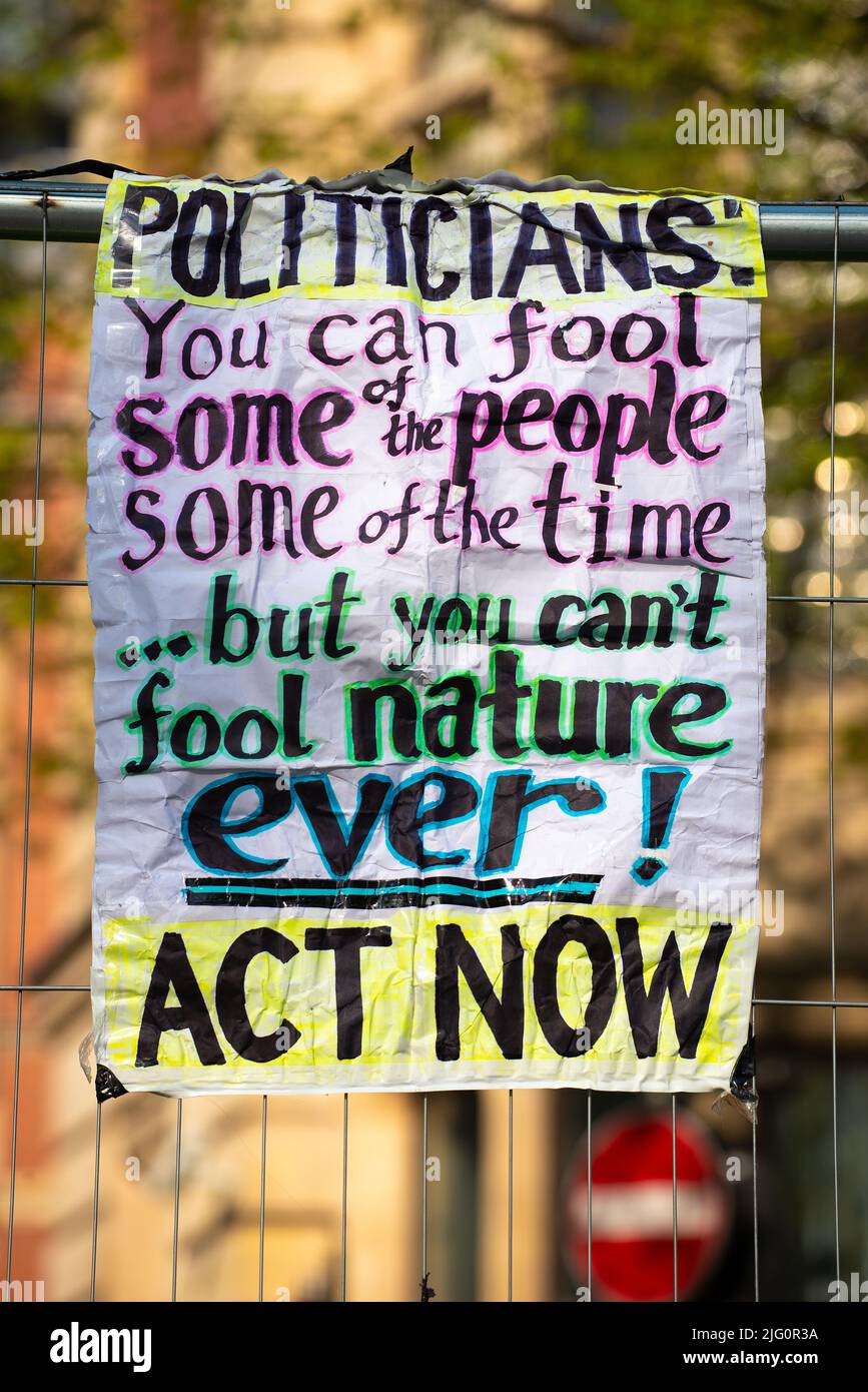 Signs at the Extinction Rebellion demonstration, in Parliament Square ...