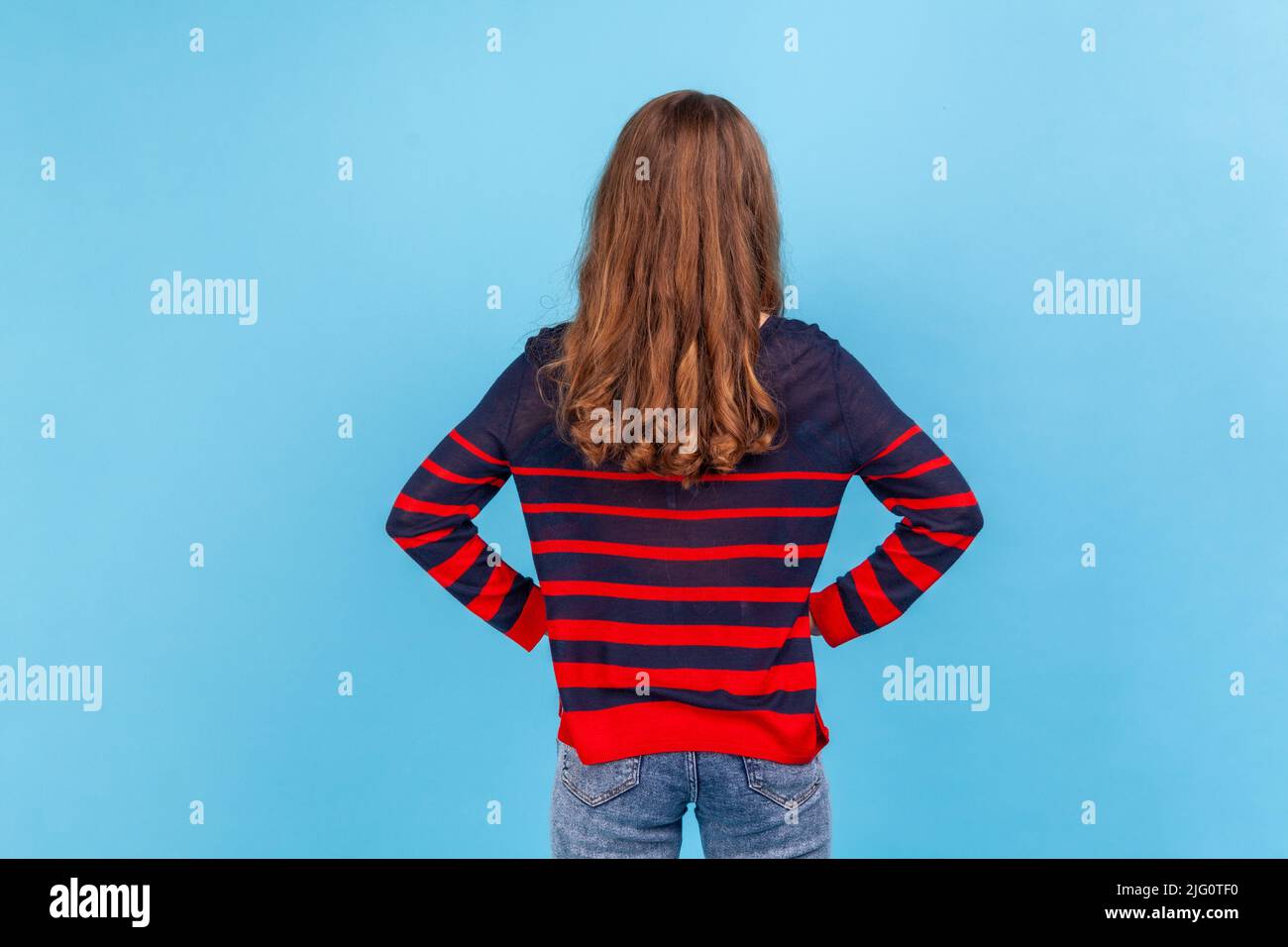 Girl hands holding something behind her back hi-res stock photography ...