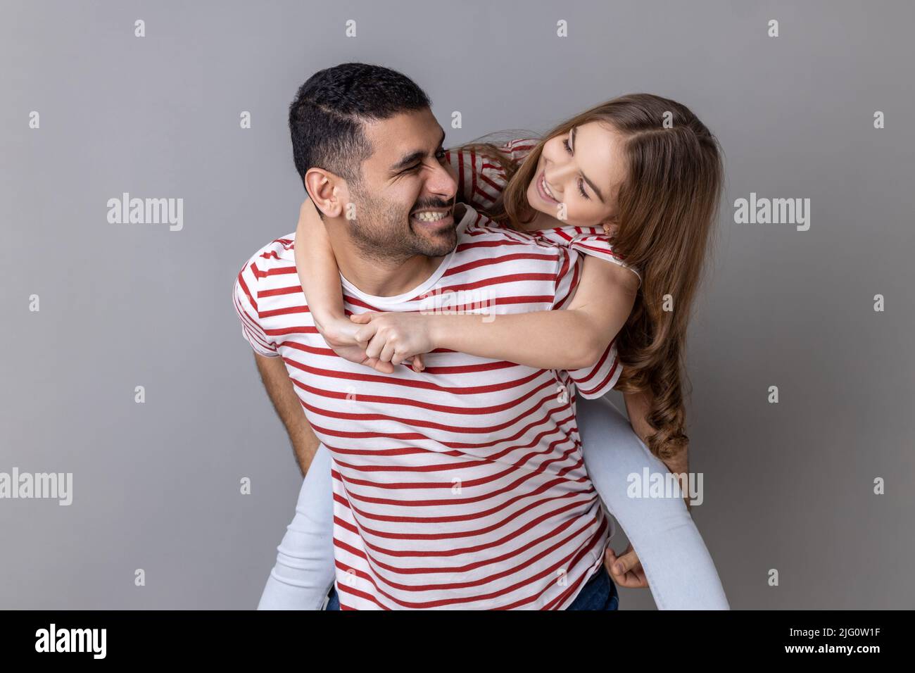 Girl piggyback ride hi-res stock photography and images - Alamy