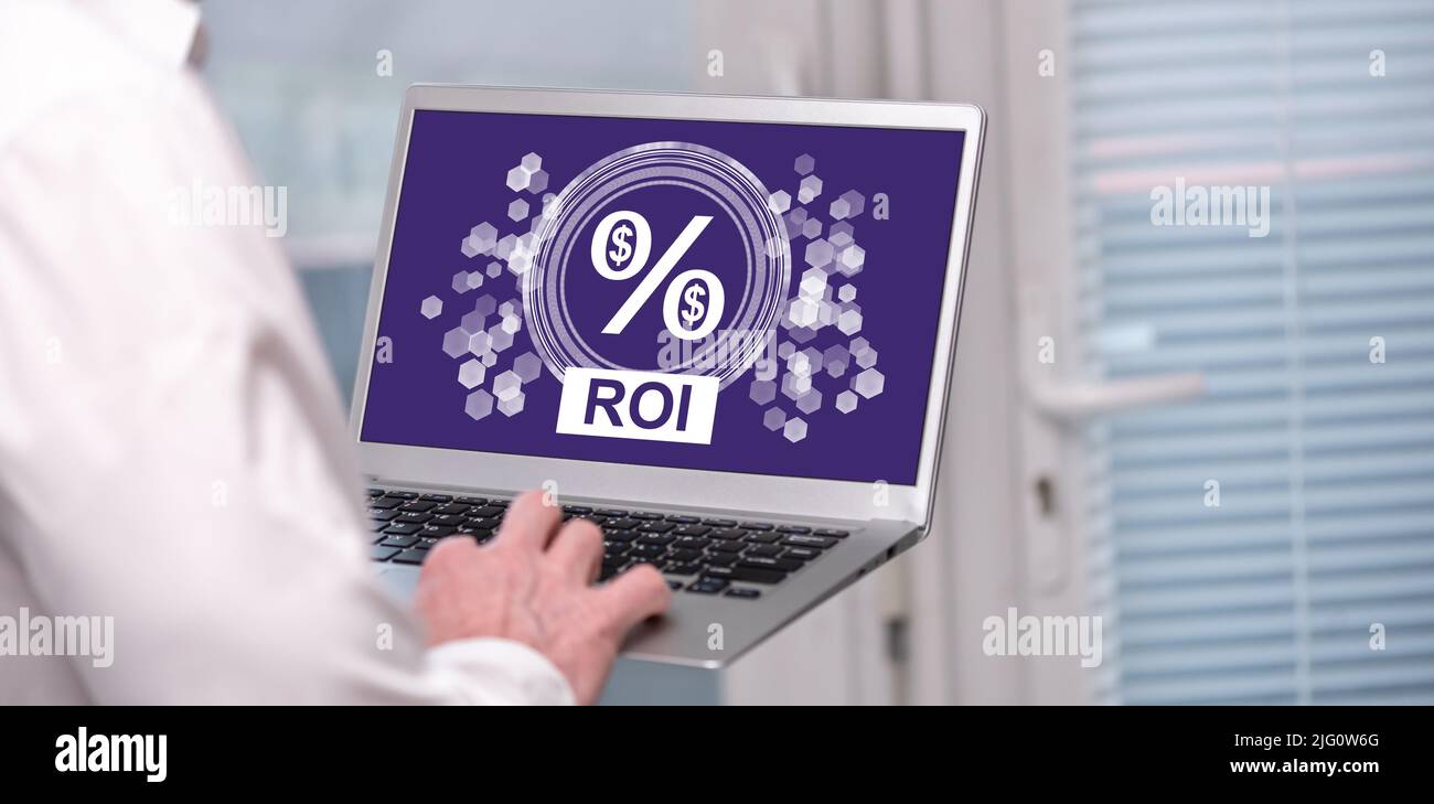Laptop screen displaying a roi concept Stock Photo - Alamy