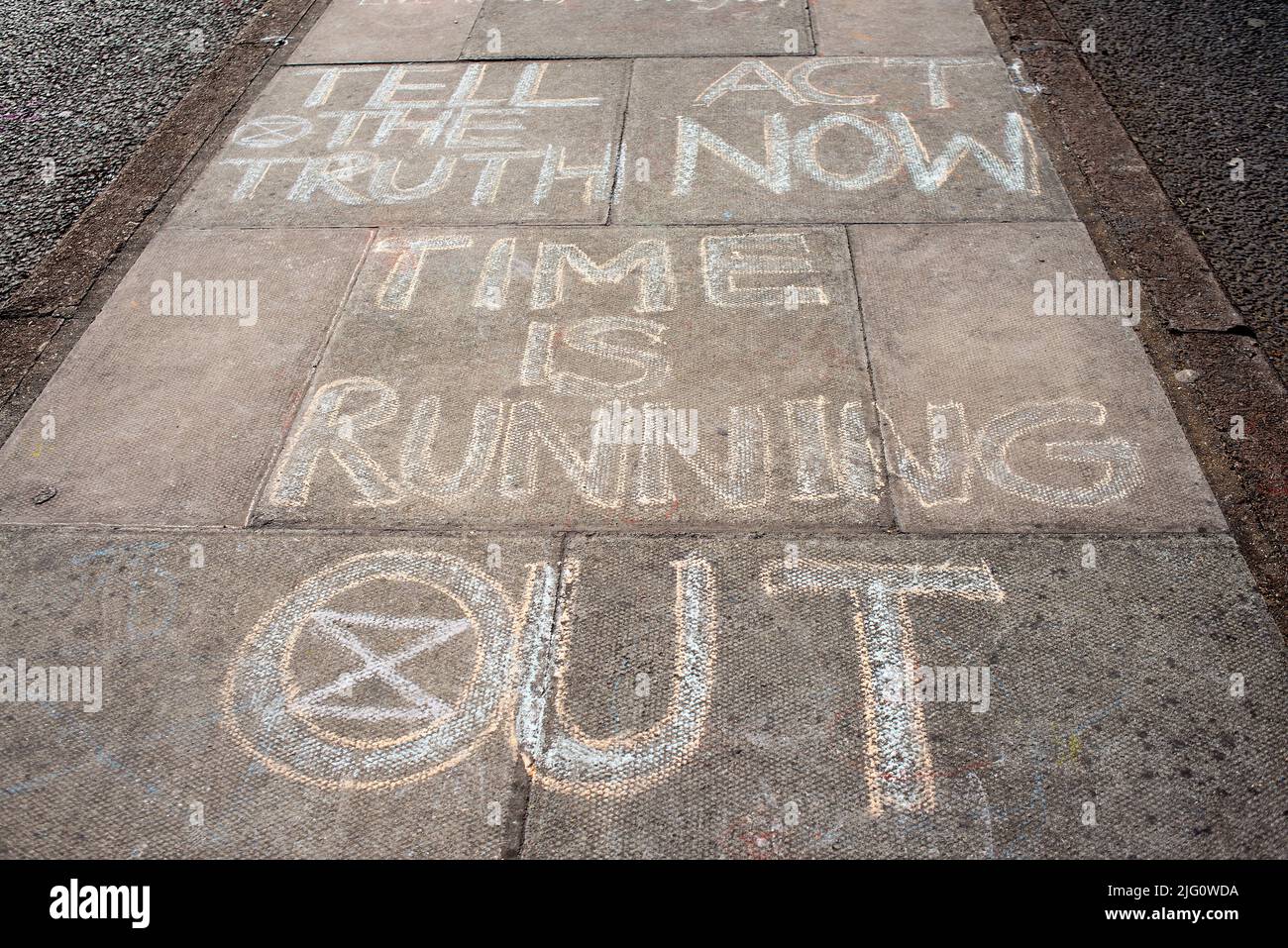 Climate change slogans hi-res stock photography and images - Alamy