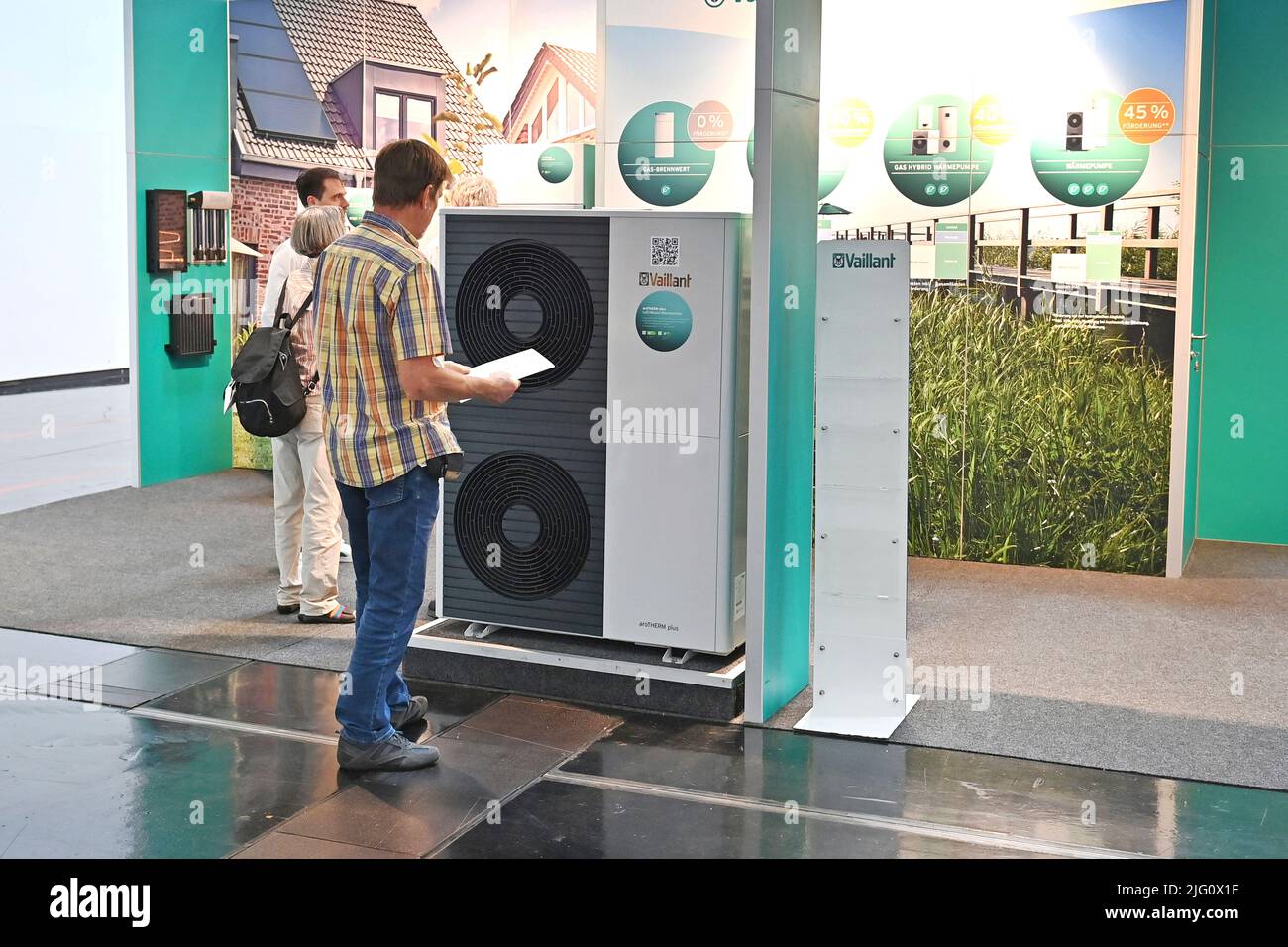 Munich, Deutschland. 06th July, 2022. A trade fair visitor stands in ...