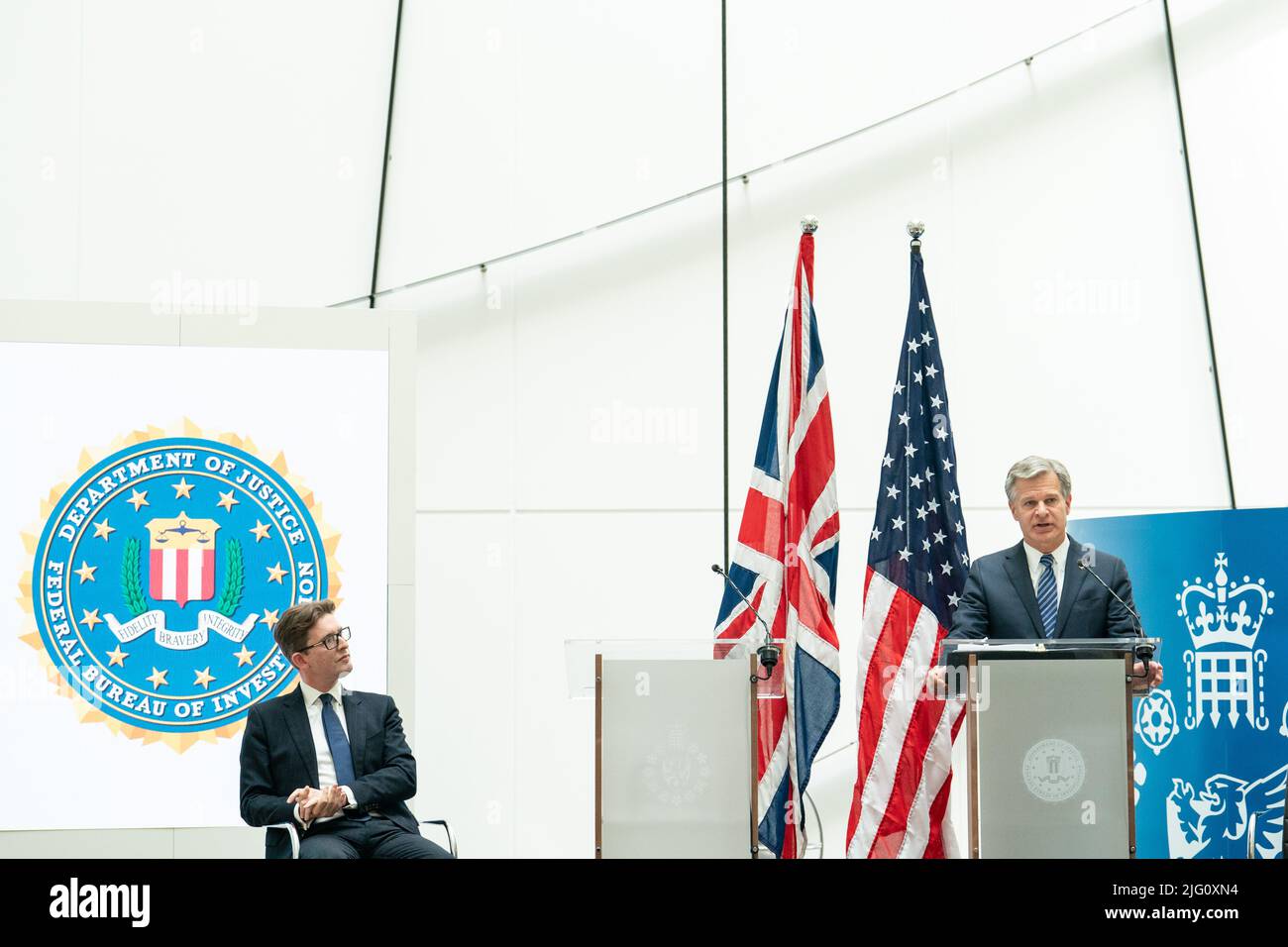 MI5 Director General Ken McCallum (left) and FBI Director Christopher ...