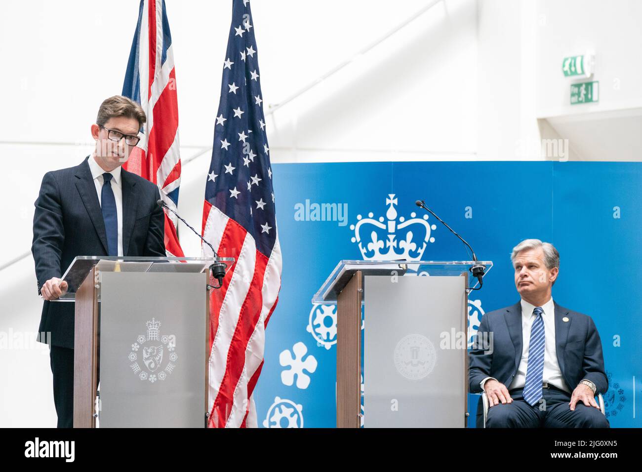 MI5 Director General Ken McCallum (left) and FBI Director Christopher ...