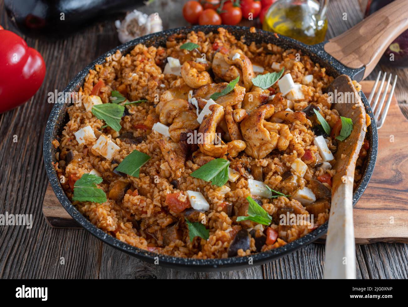 Eggplant rice pan with vegetables. Cooked with real feta cheese, brown ...