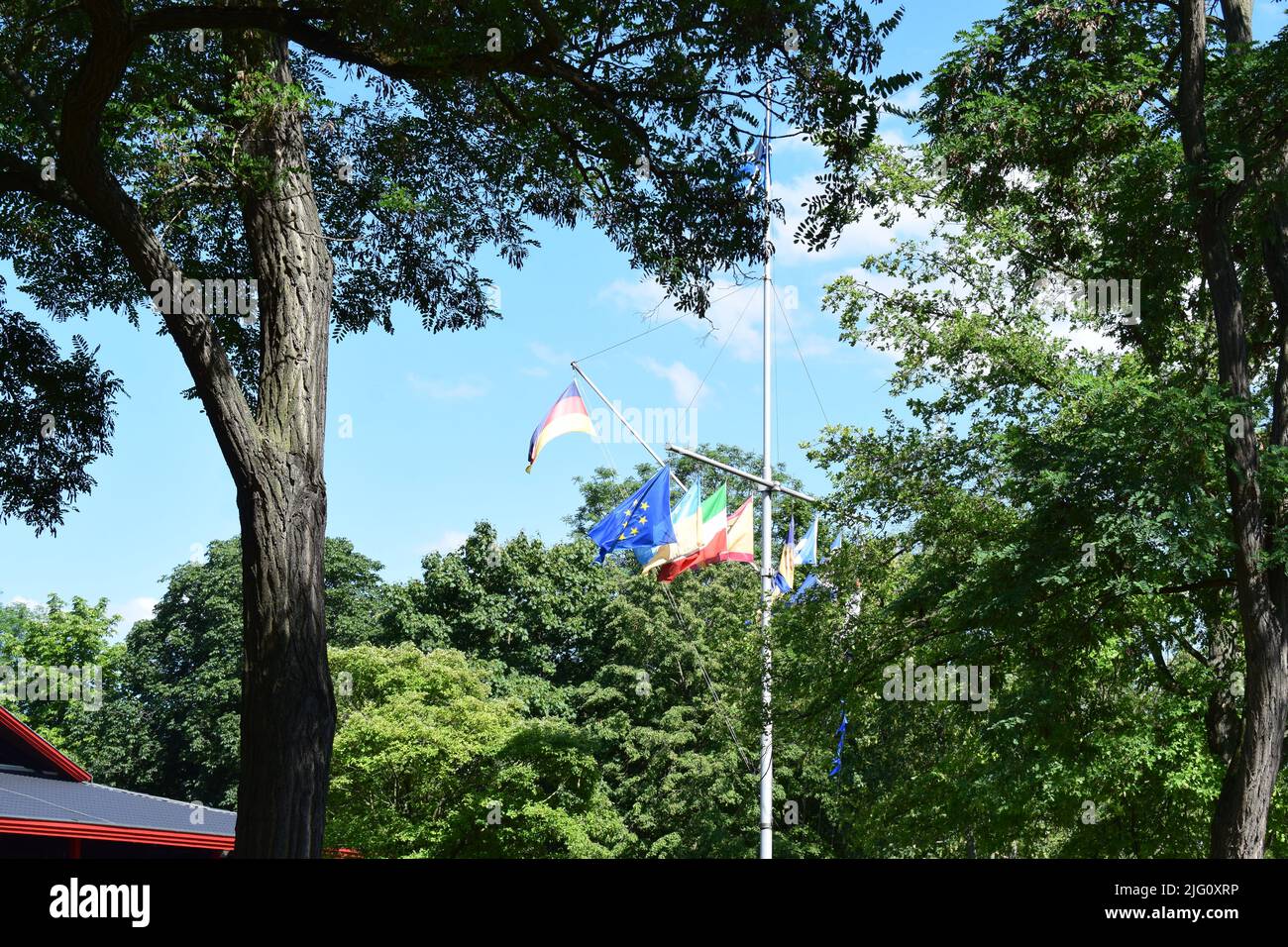 flags in a park Stock Photo - Alamy