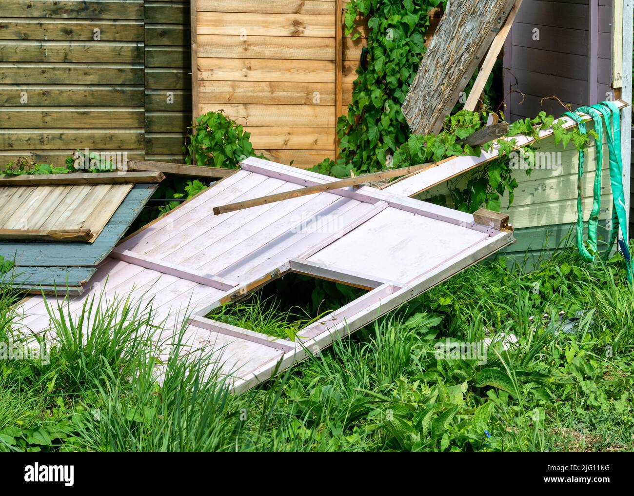 Decay - a collapsed hut shed left to rot Stock Photo - Alamy