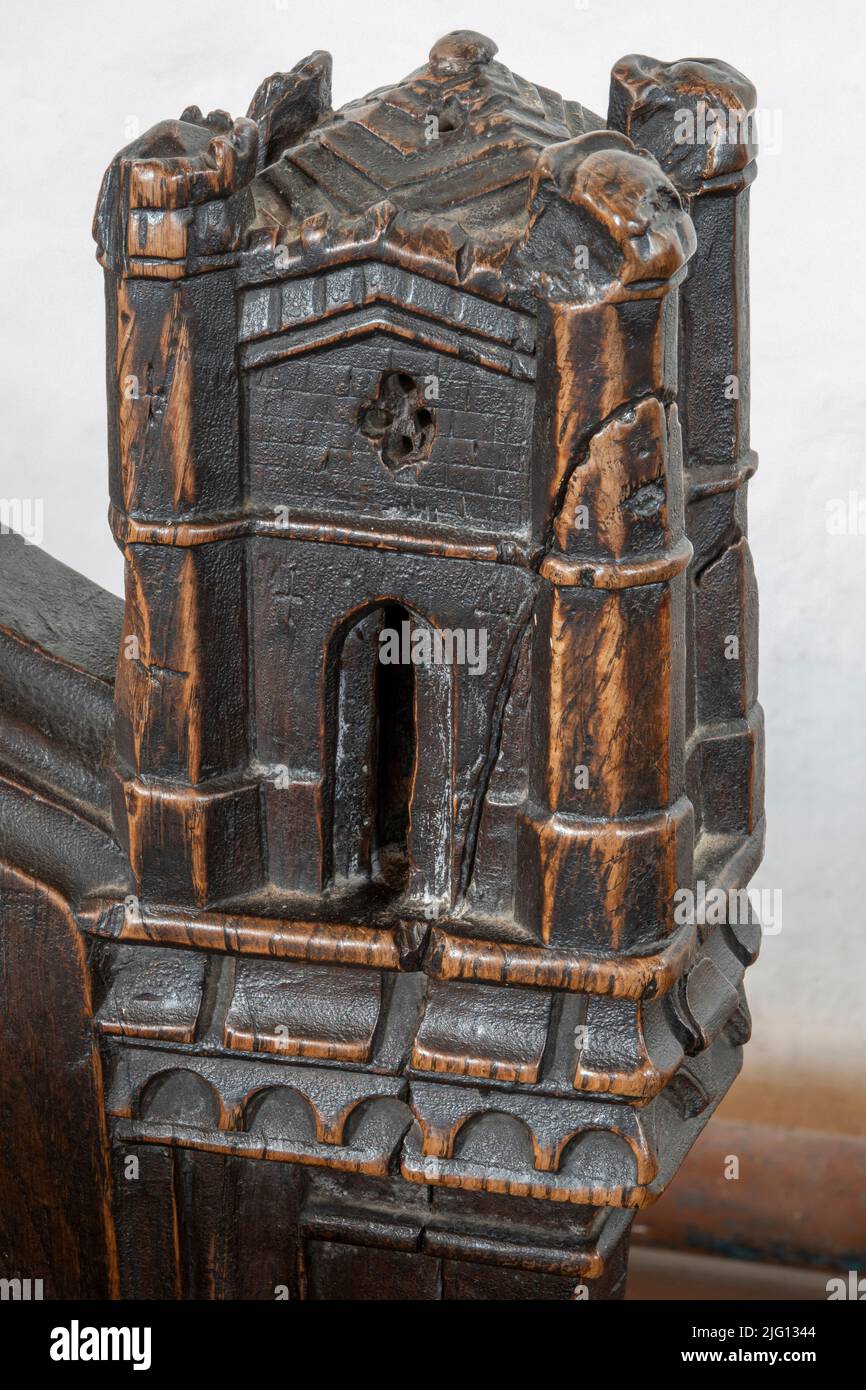 15th century wood carved bench end forming a castle at All Saints ...