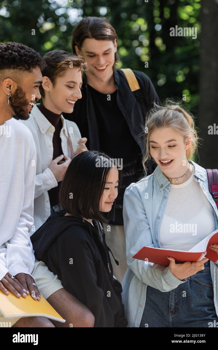 Multicultural students near college hi-res stock photography and images ...