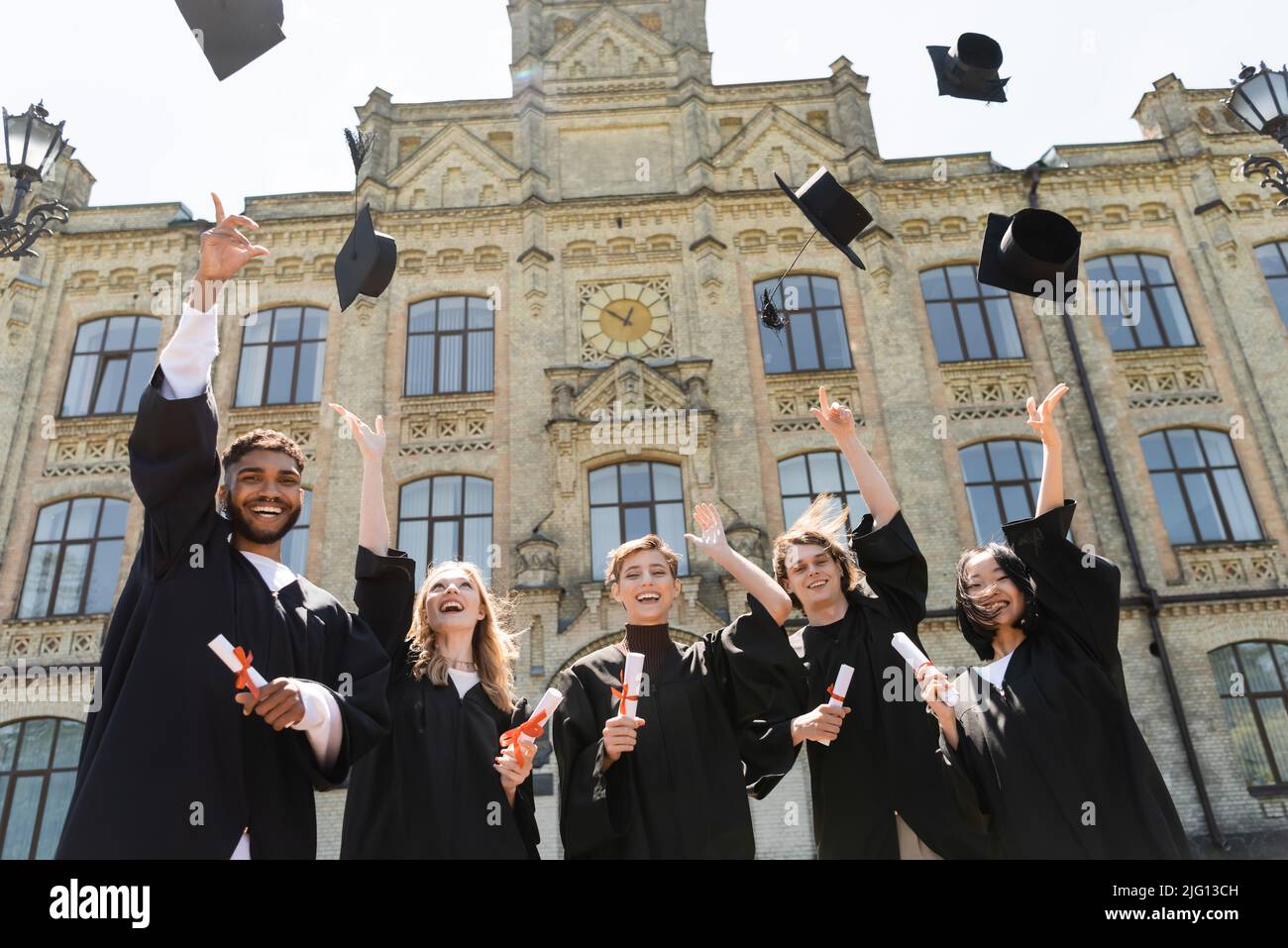 Graduation group low angle hi-res stock photography and images - Alamy