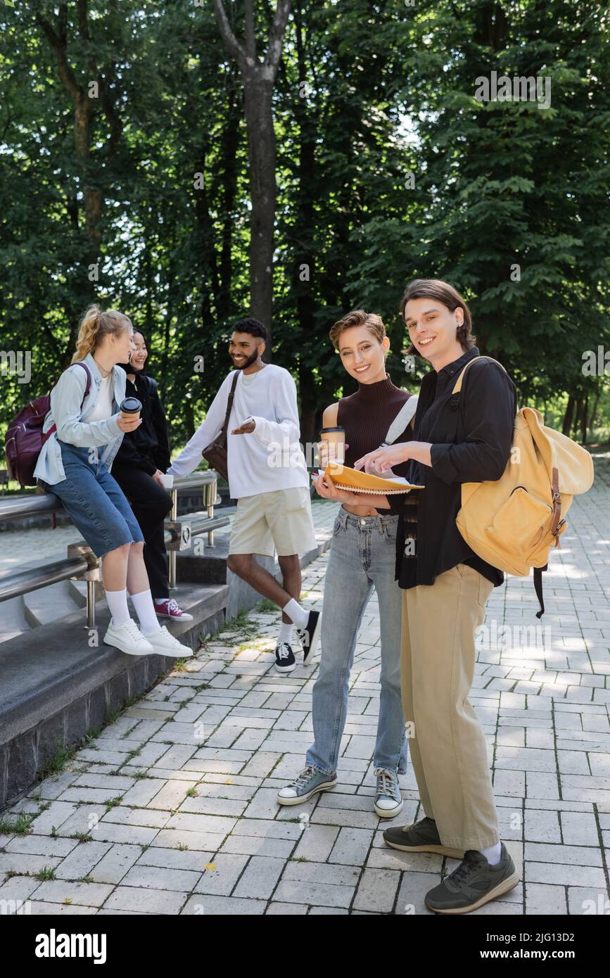 Multiethnic students holding notebooks hi-res stock photography and ...