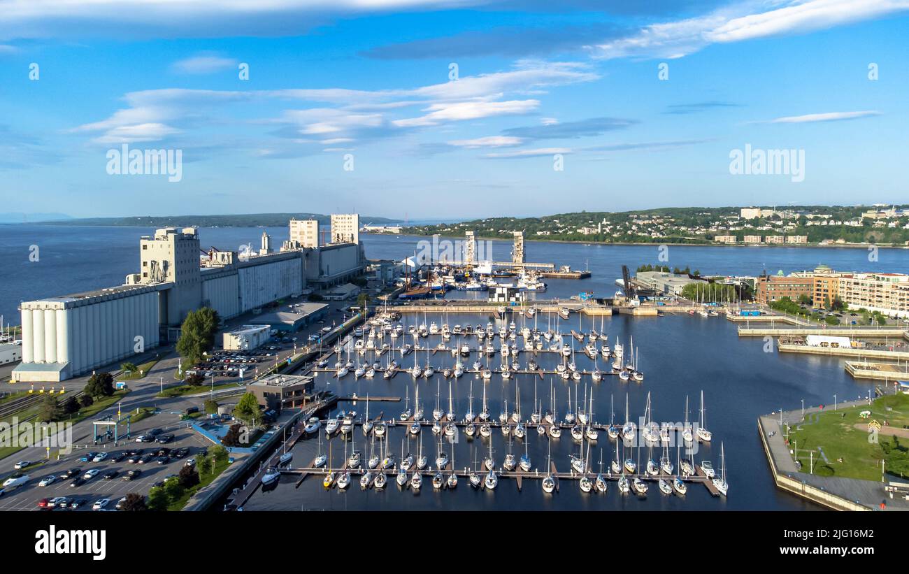 Quebec city's marina in the Old port. View on Orlean's Island and St ...