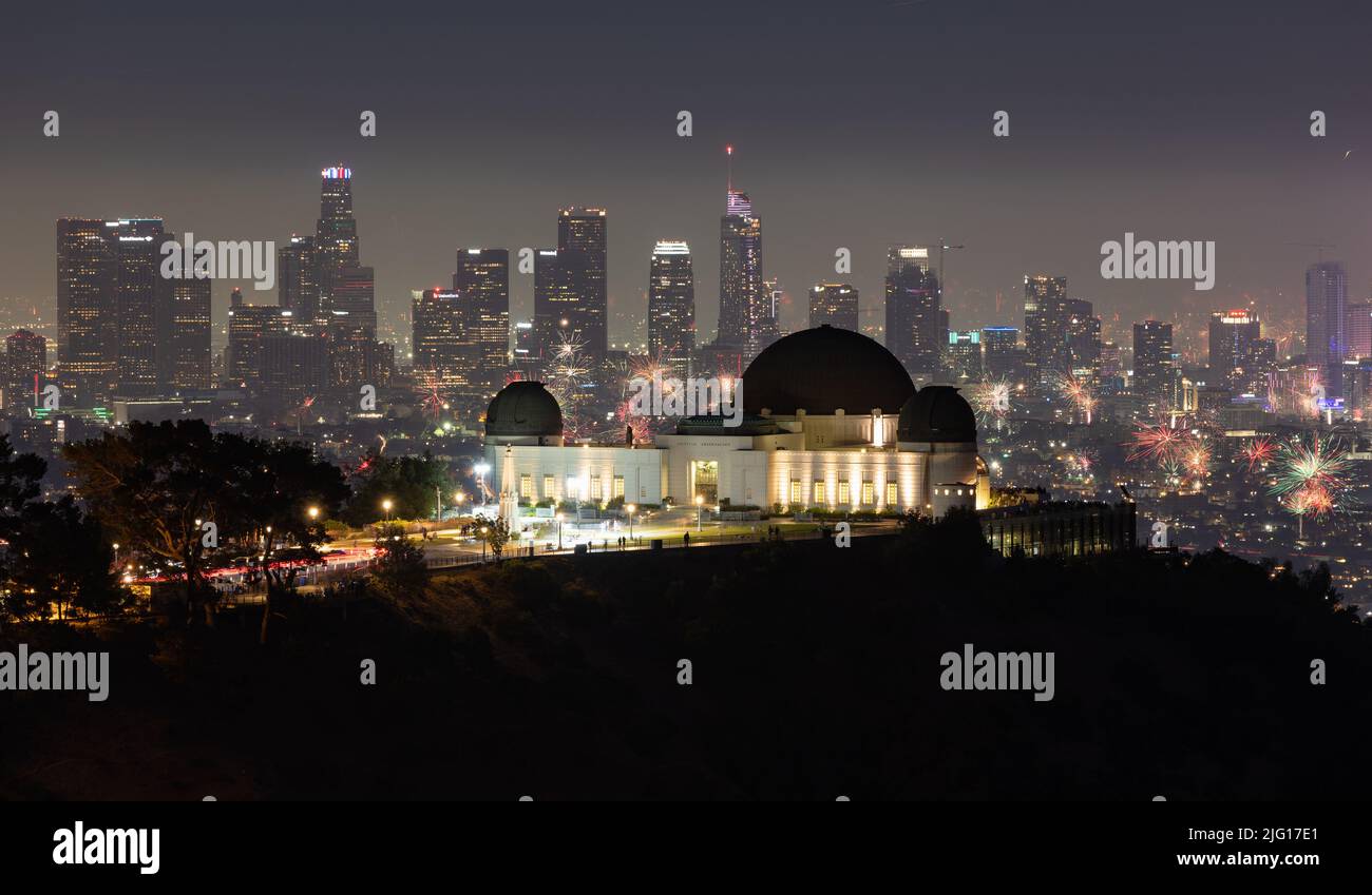 Fireworks over Griffith Observatory with the Los Angeles skyline in the ...