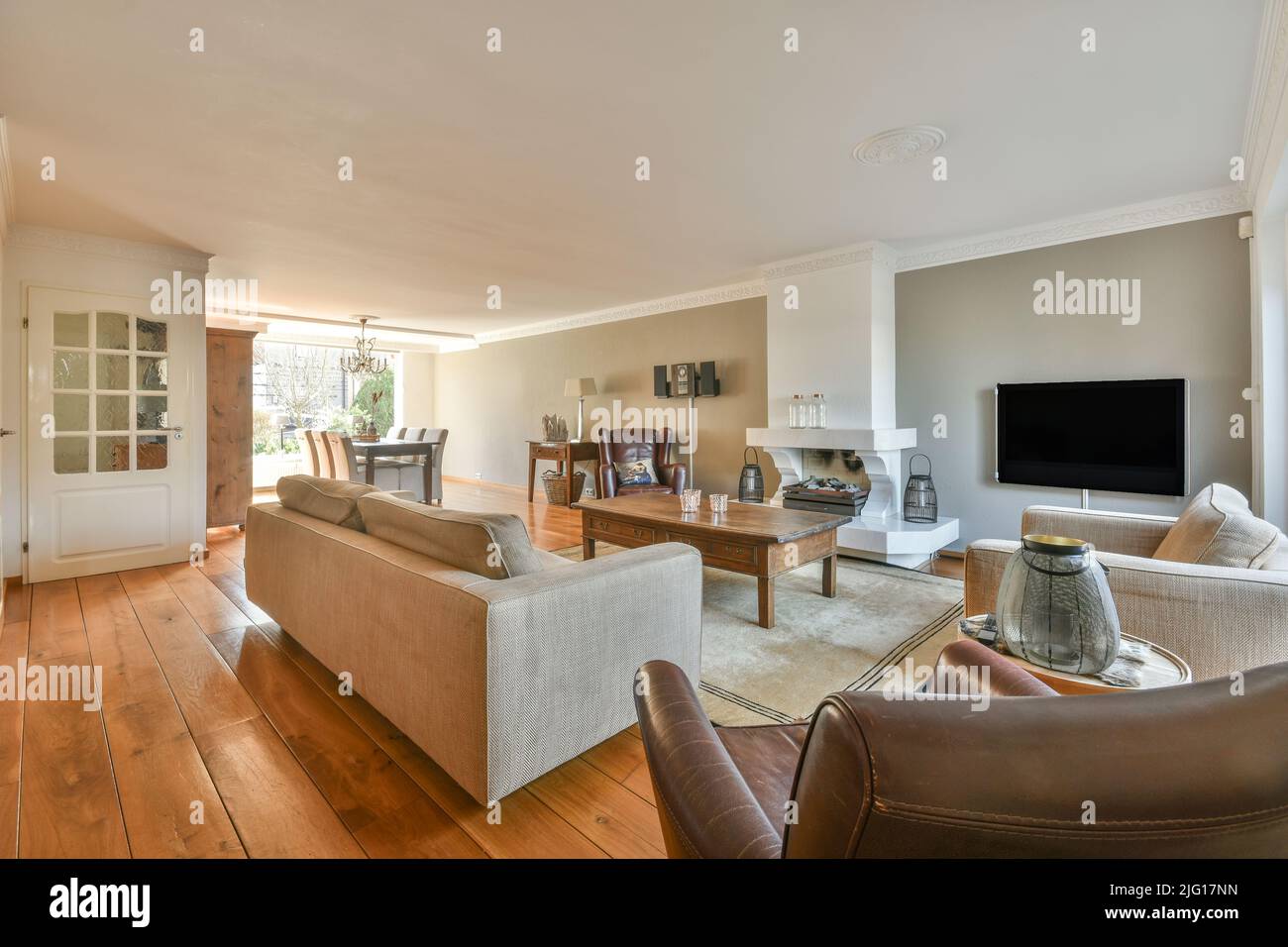 Stylish luxury home interior design of cozy living room with burning ...