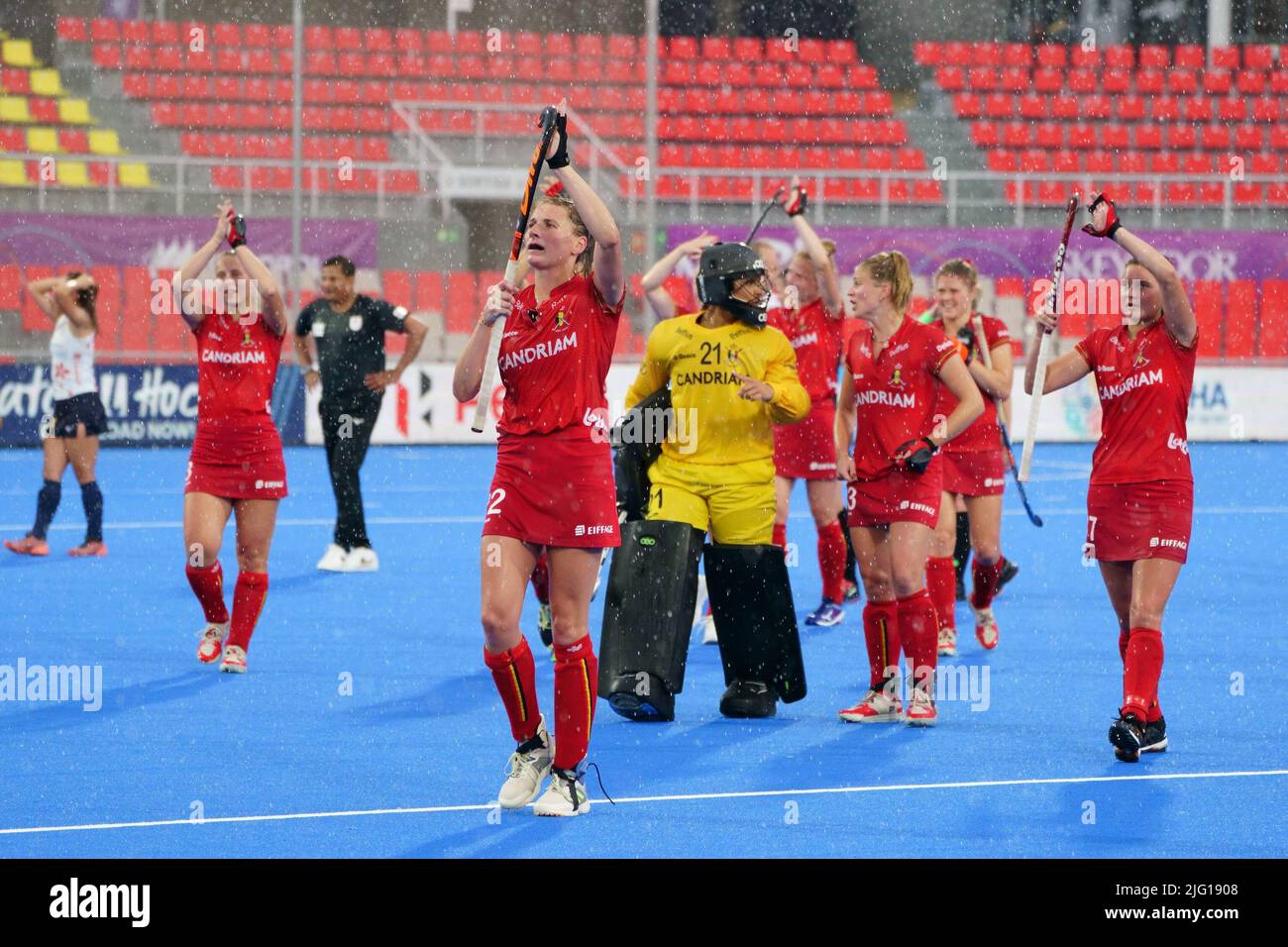 Belgium's players celebrate after winning a hockey match between ...
