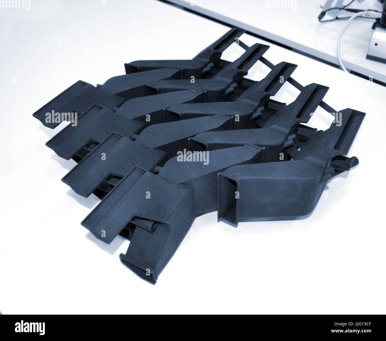Models printed on 3D printer isolated on white background. Objects ...