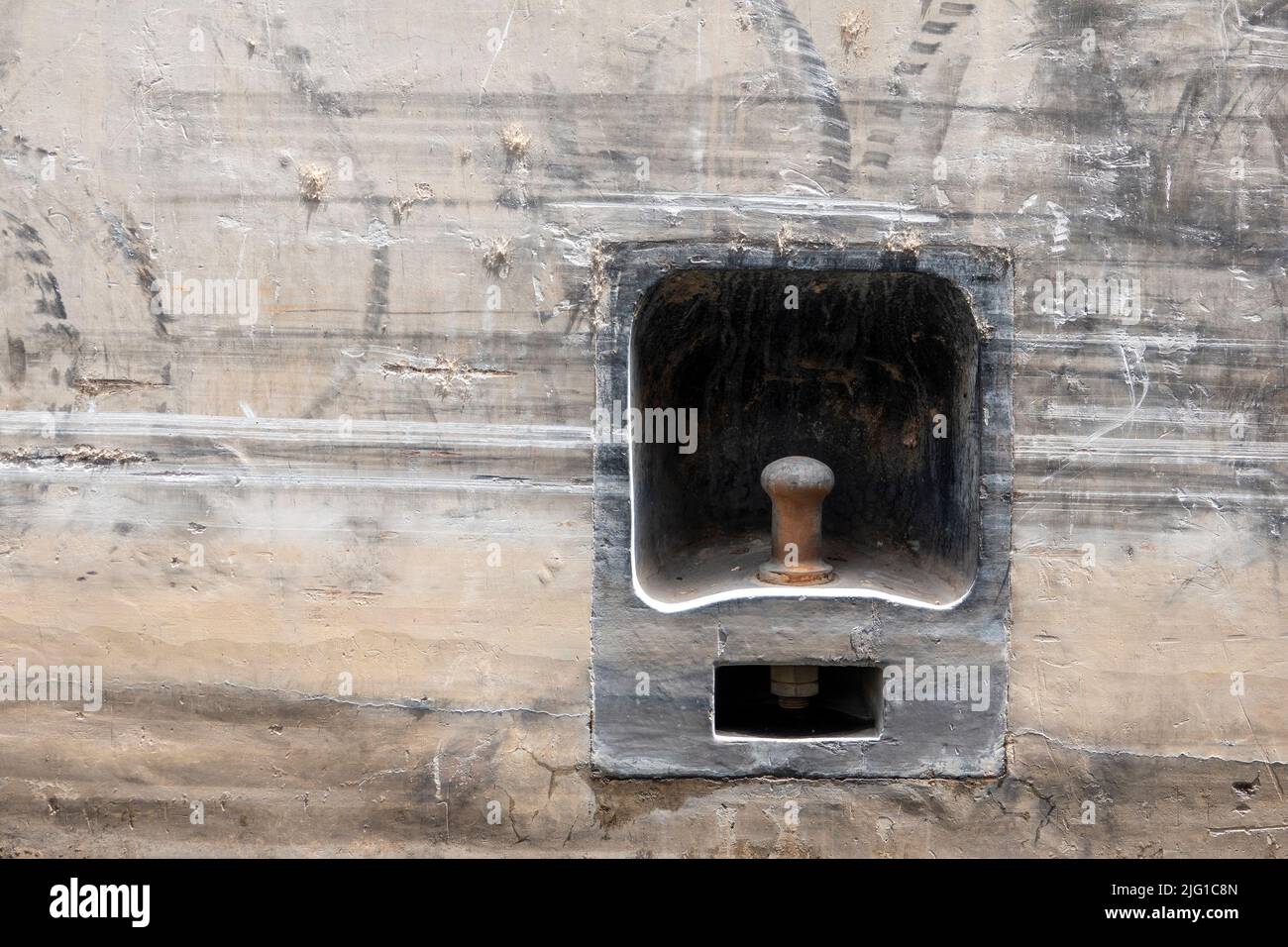 Steel mooring bollard set in the side of a large lock and barrage on ...