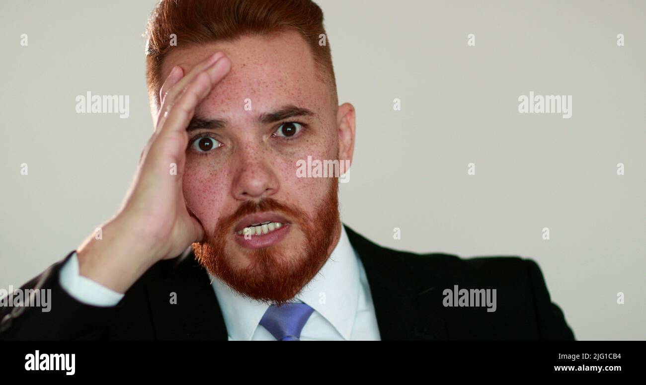 Perplexed man reaction with unbelief emotion. Person hiding face with ...