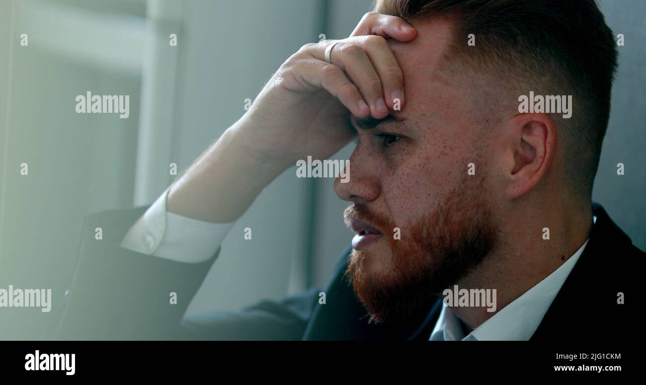 Stressed business man looking up to sky looking for help from God Stock ...