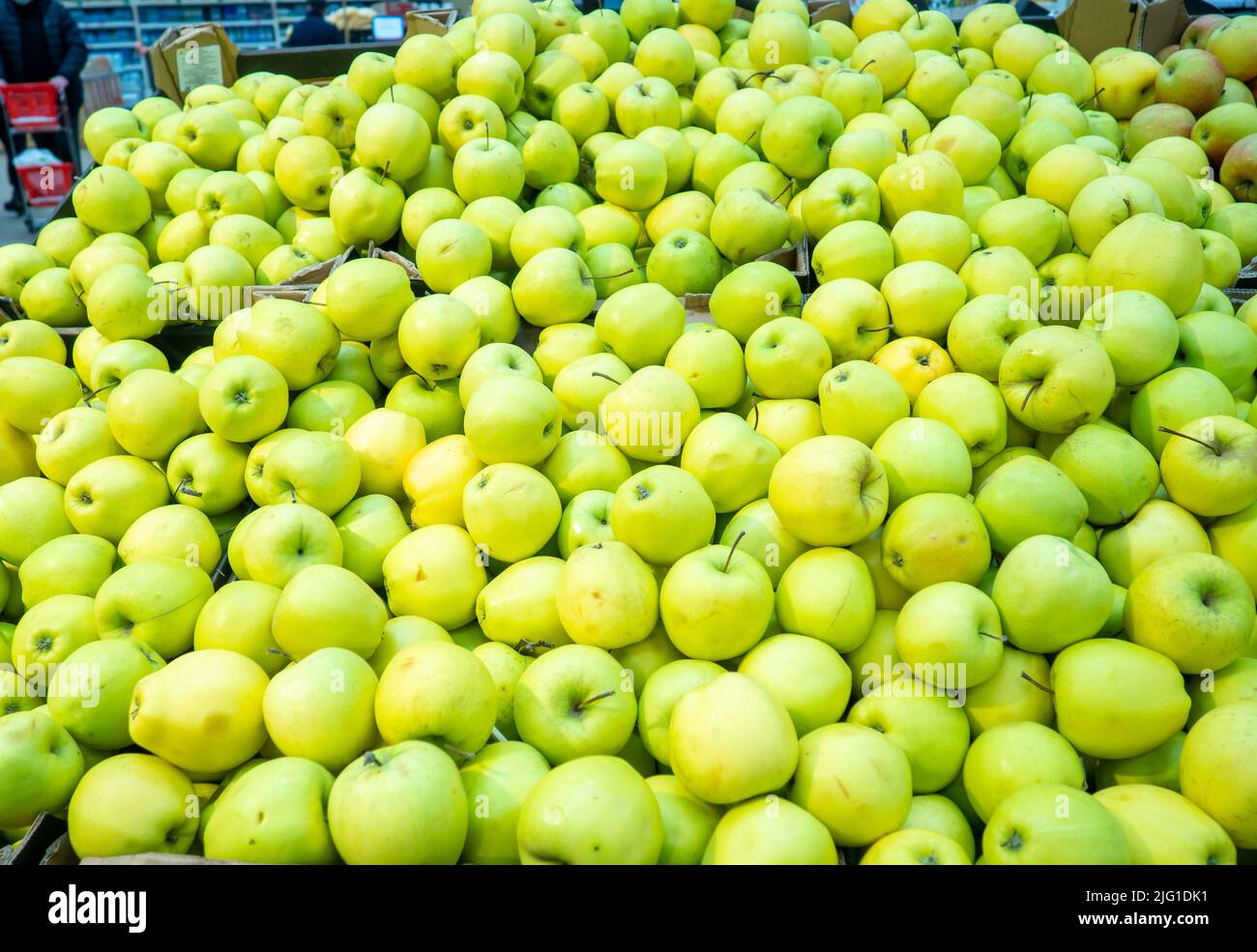 Fruits shop. Healthy foods. Golden apples on the counter. Fruit ...